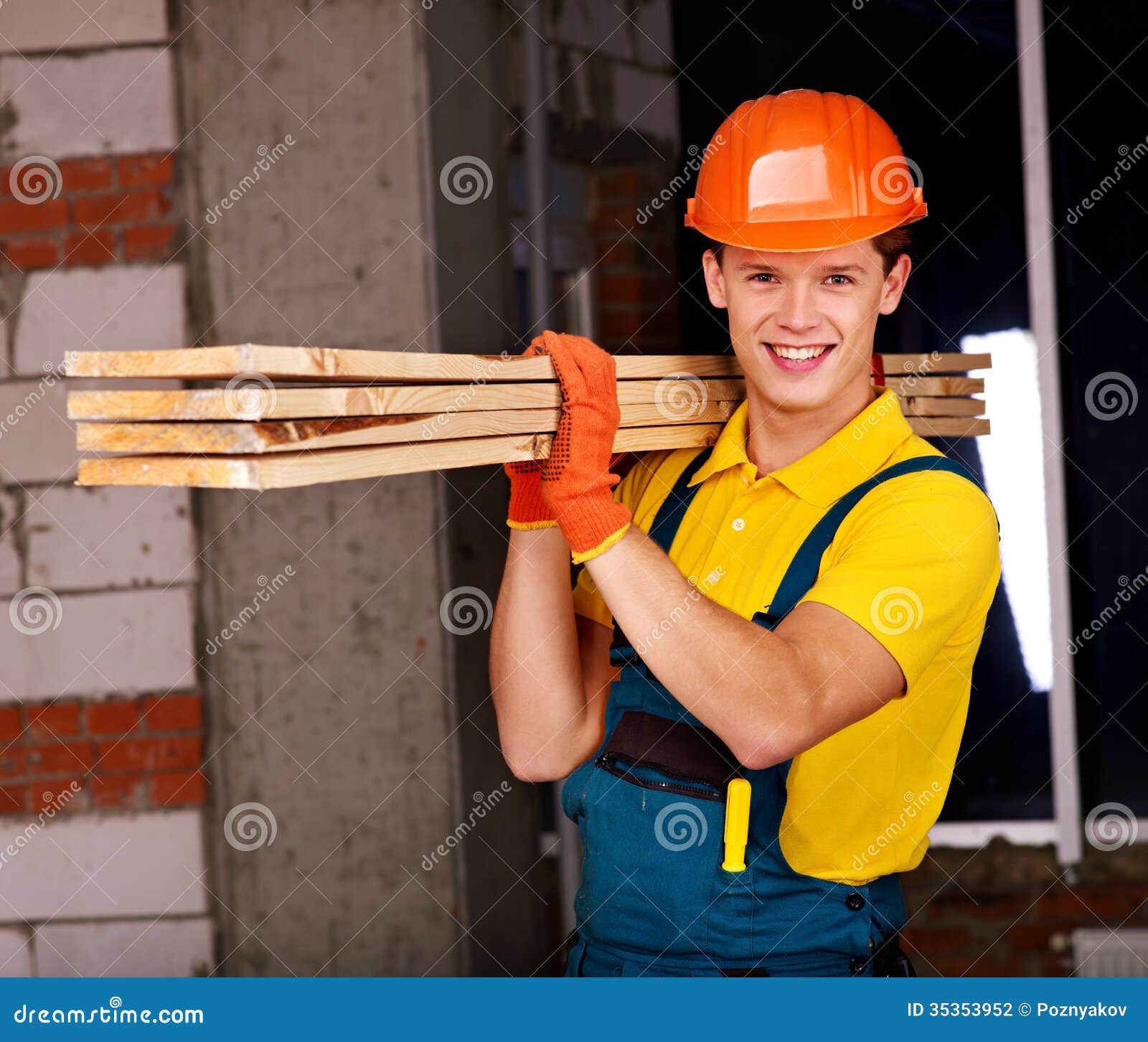 Man in builder uniform. stock photo. Image of constructor - 35353952