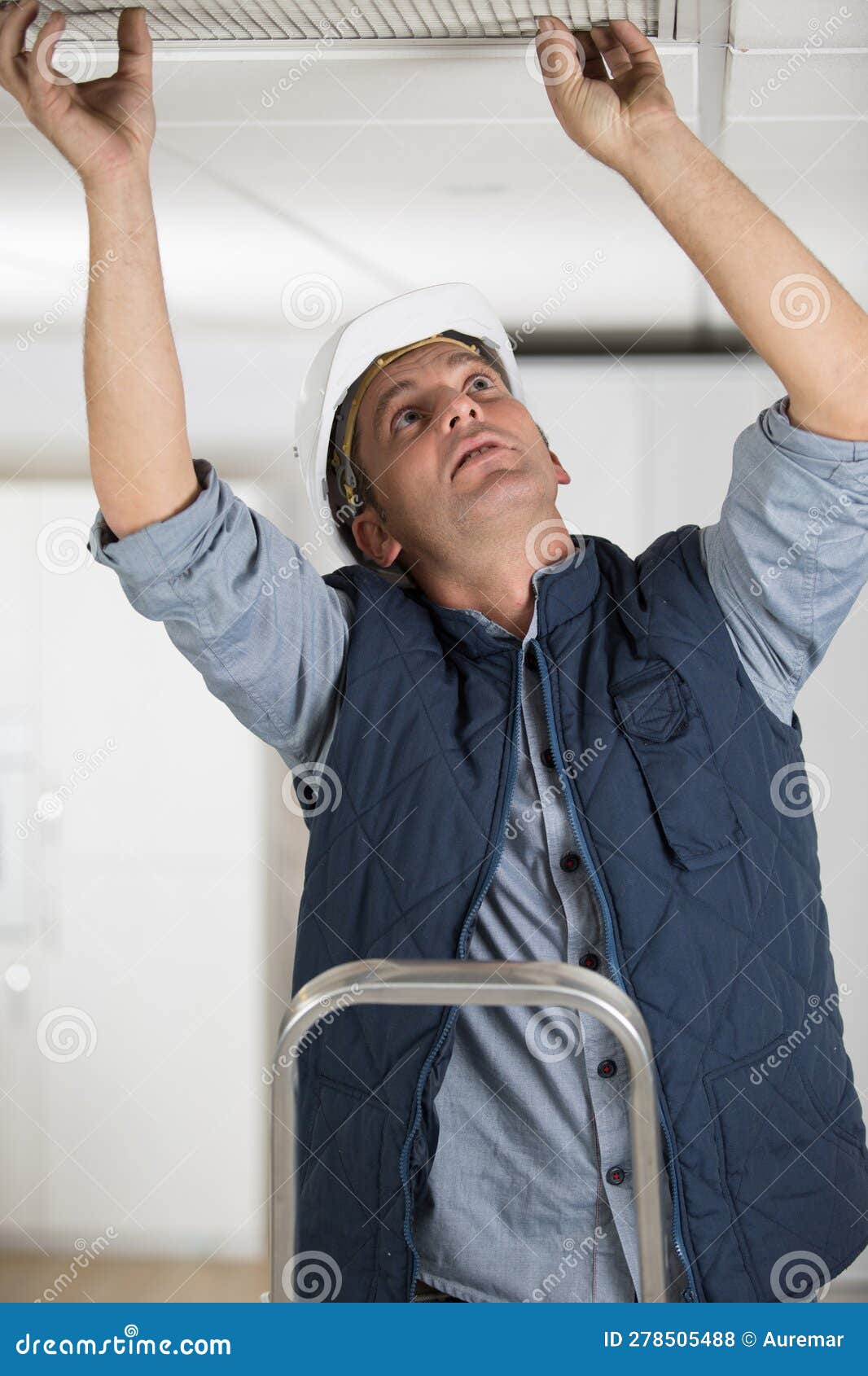 Man in Builder Uniform Installing Suspended Ceiling Stock Photo - Image ...