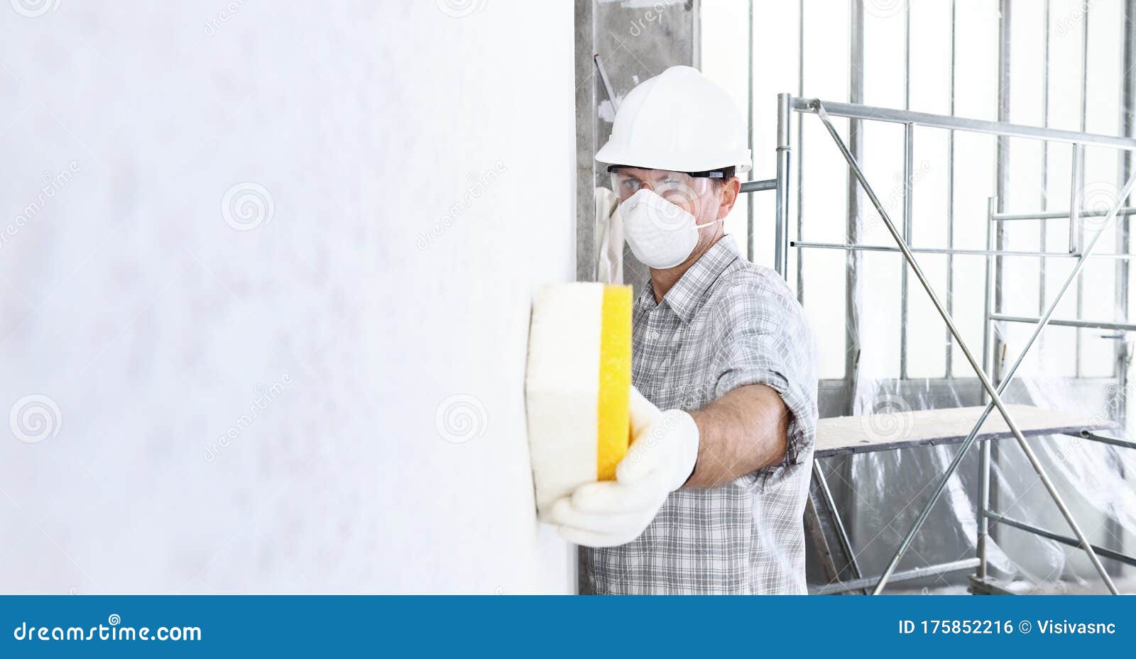 Man Builder Using a Sponge on Wall Professional Construction Worker ...