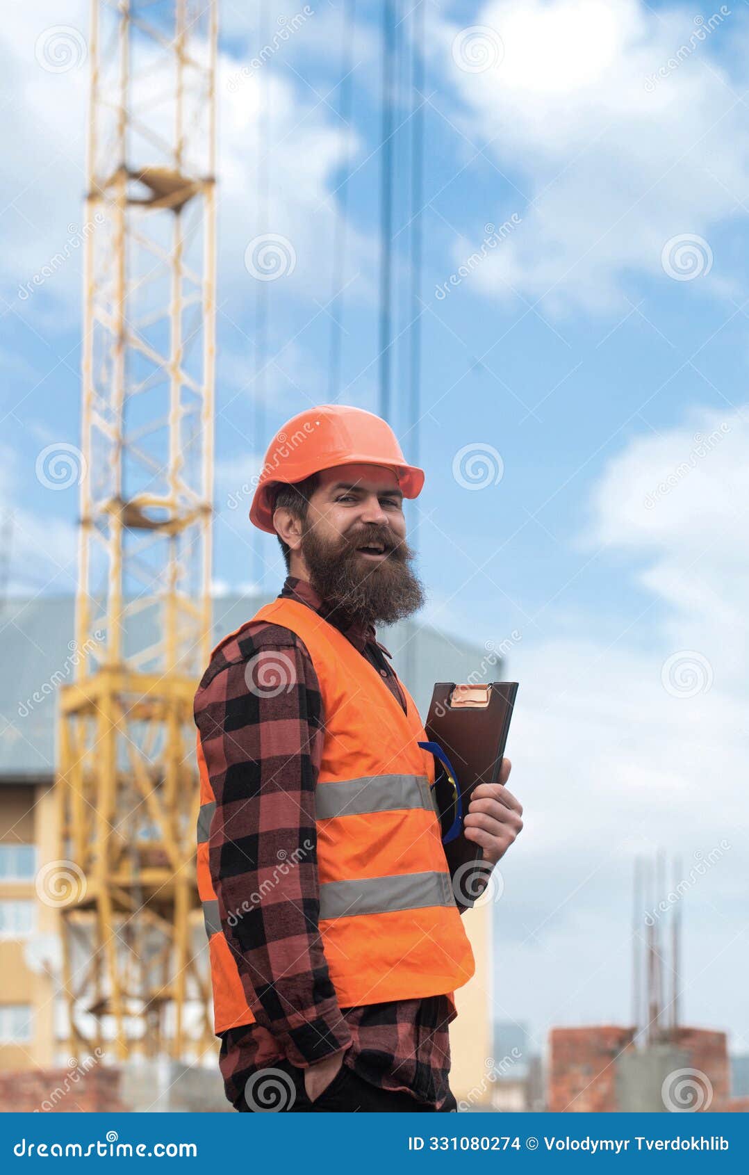 Man Builder Worker in Helmet Posing on Construction Site. Industrial ...