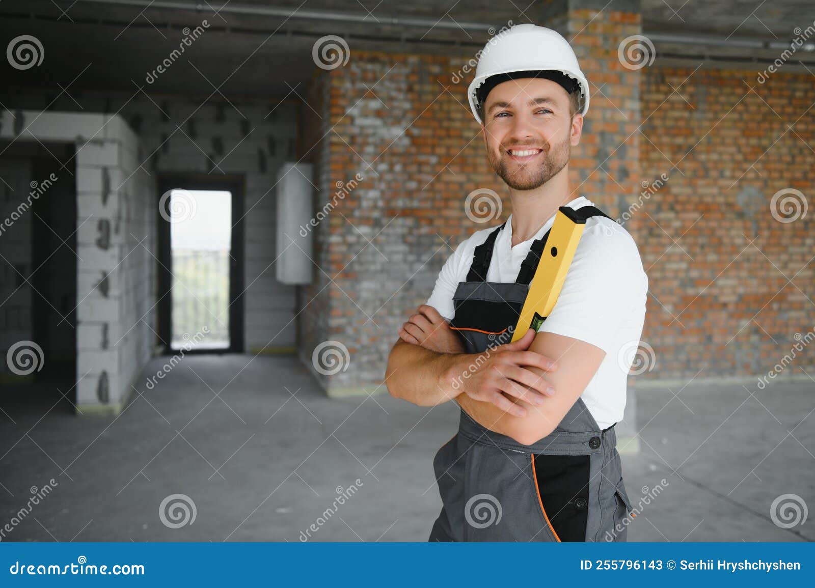 Man Builder Working in Construction Site. Male Repairer in Overall and ...