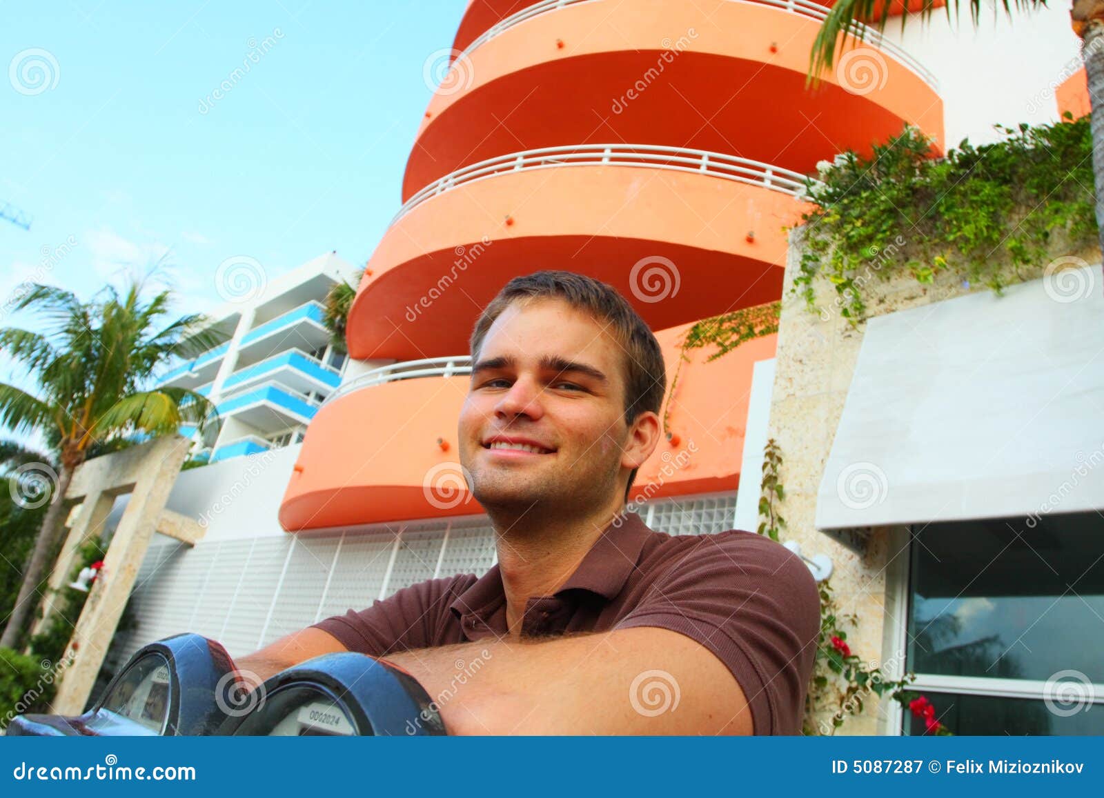 Man with Building in Background Stock Image - Image of smile, male: 5087287