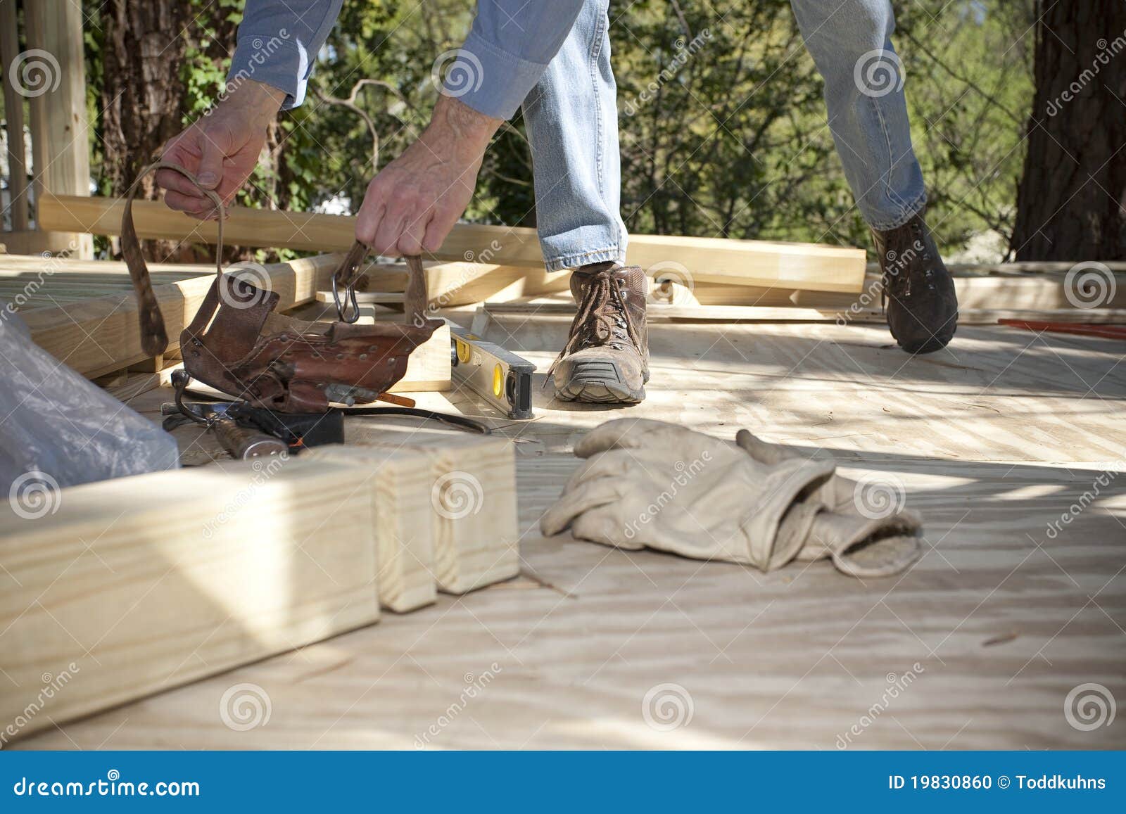 Man Building a Deck stock photo. Image of construction - 19830860