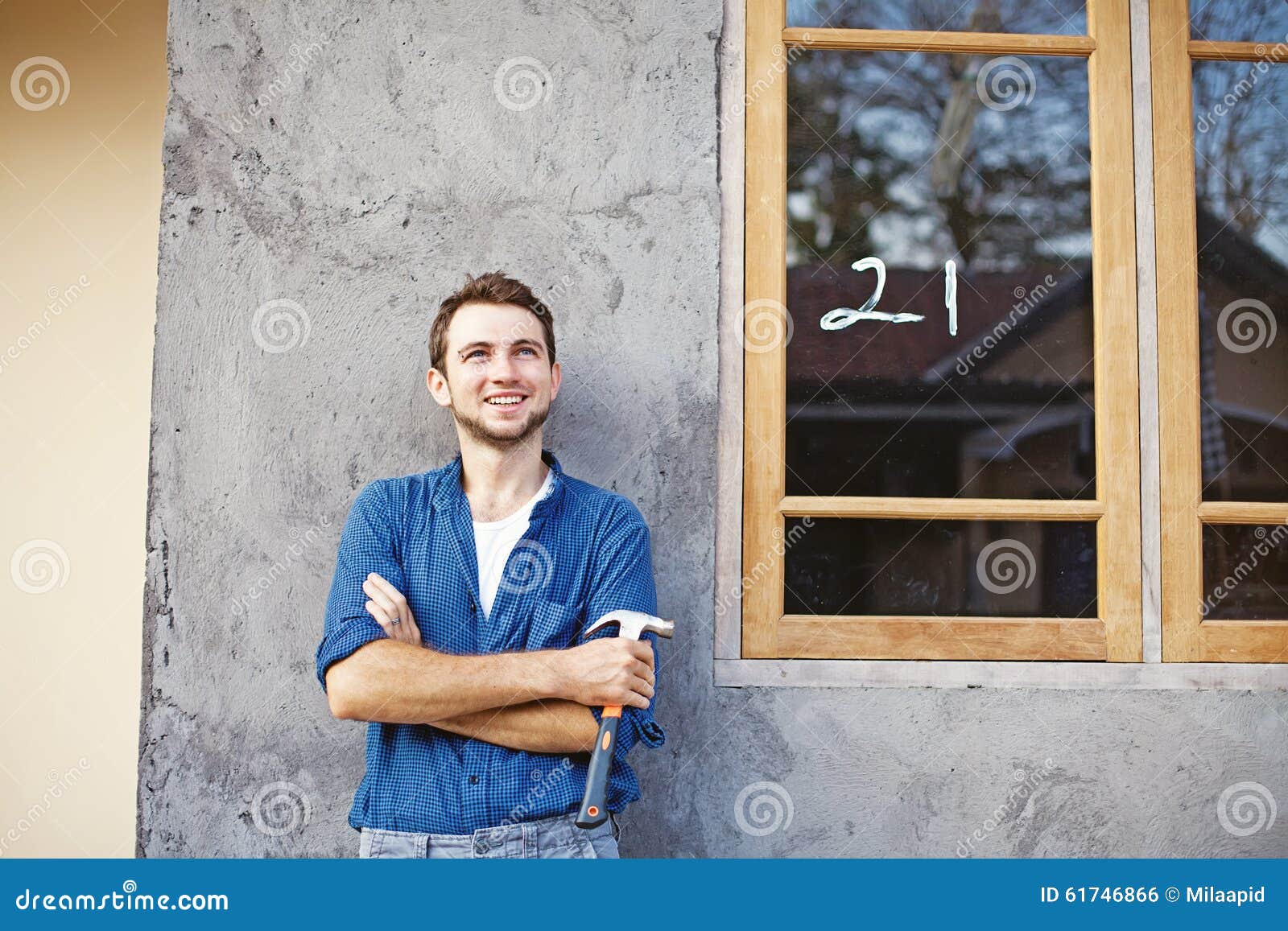 Man building his house stock photo. Image of lifestyles - 61746866