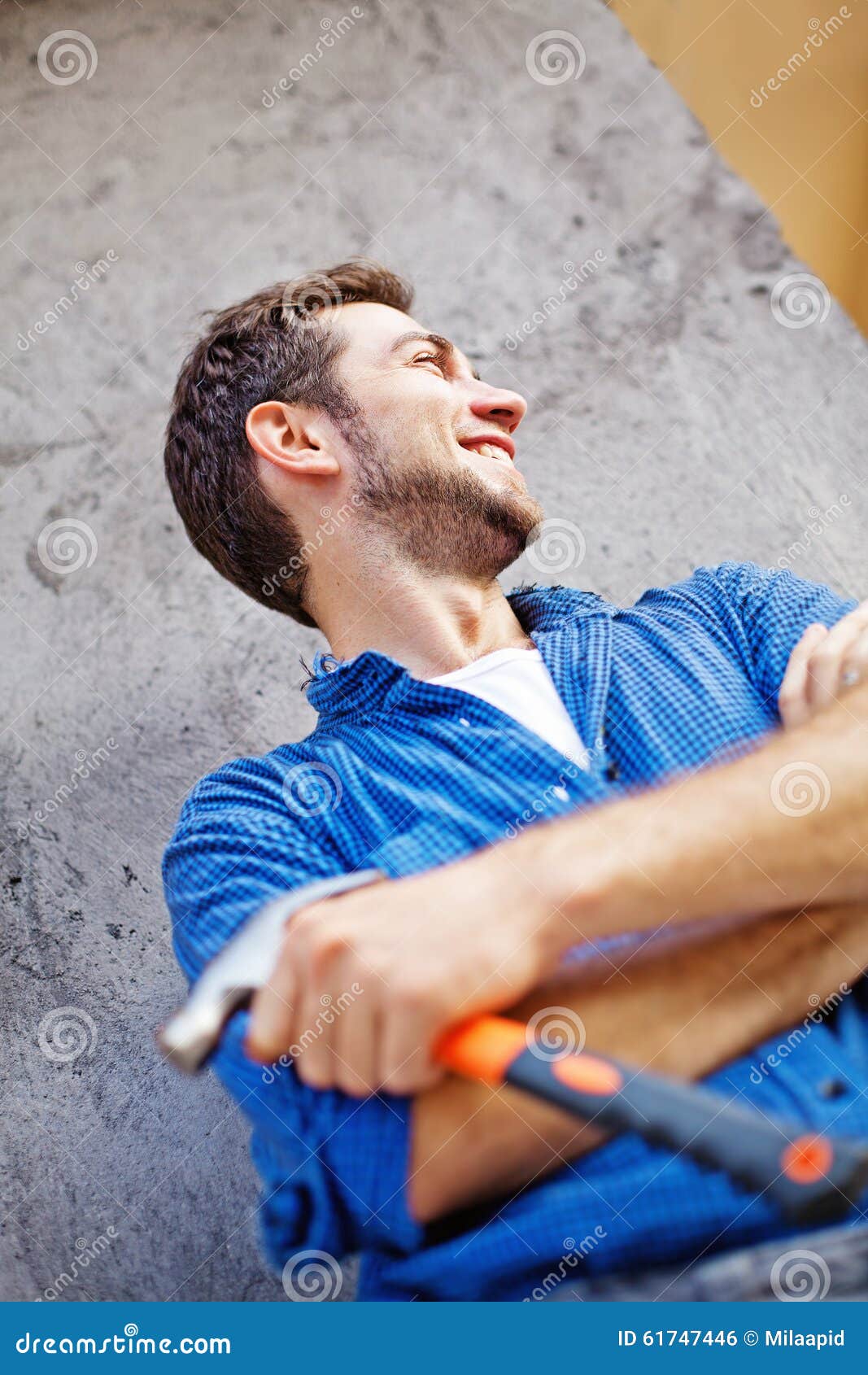 Man building his house stock photo. Image of contractor - 61747446