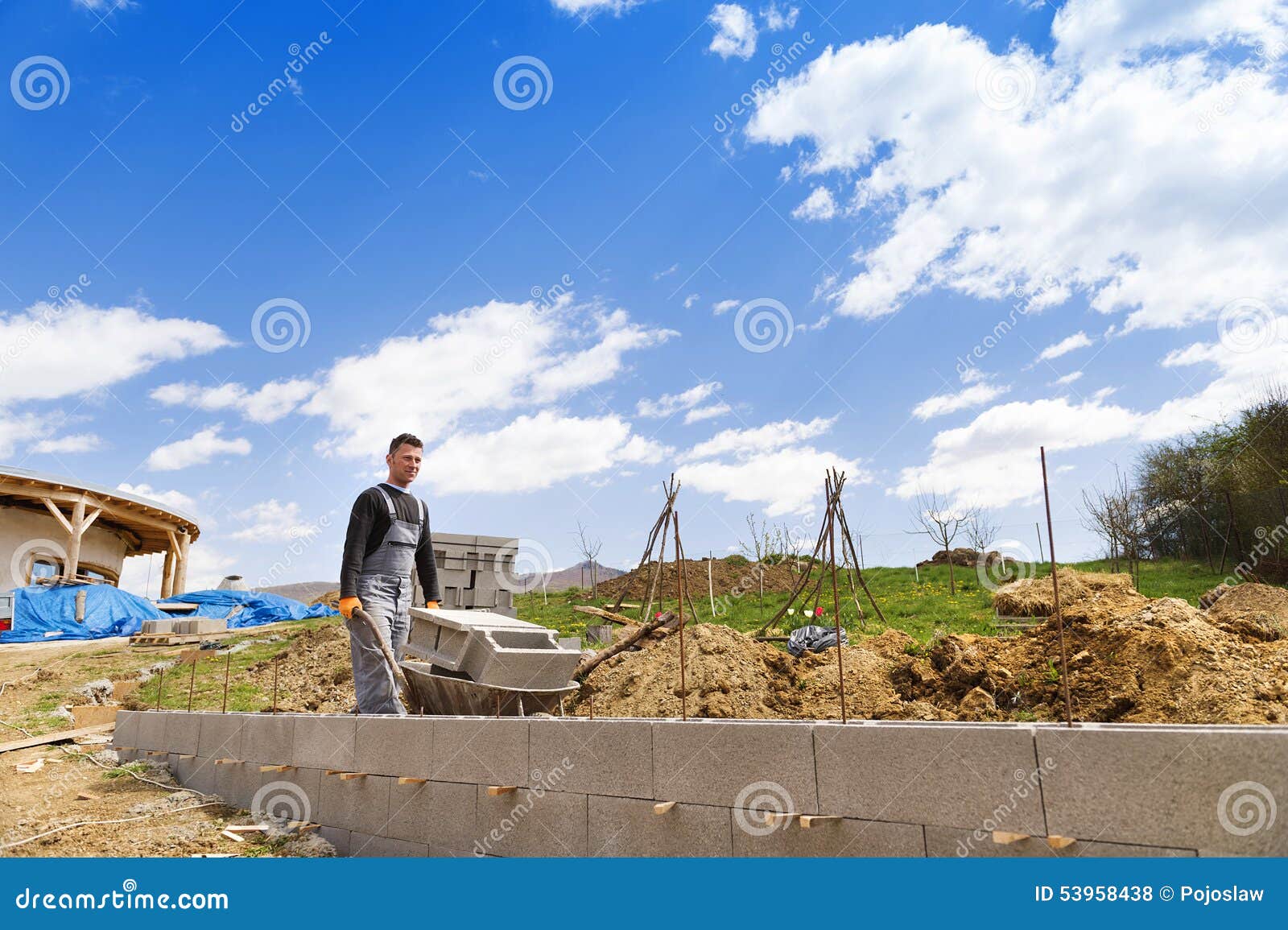 Man building a house stock photo. Image of hands, bricklayer - 53958438
