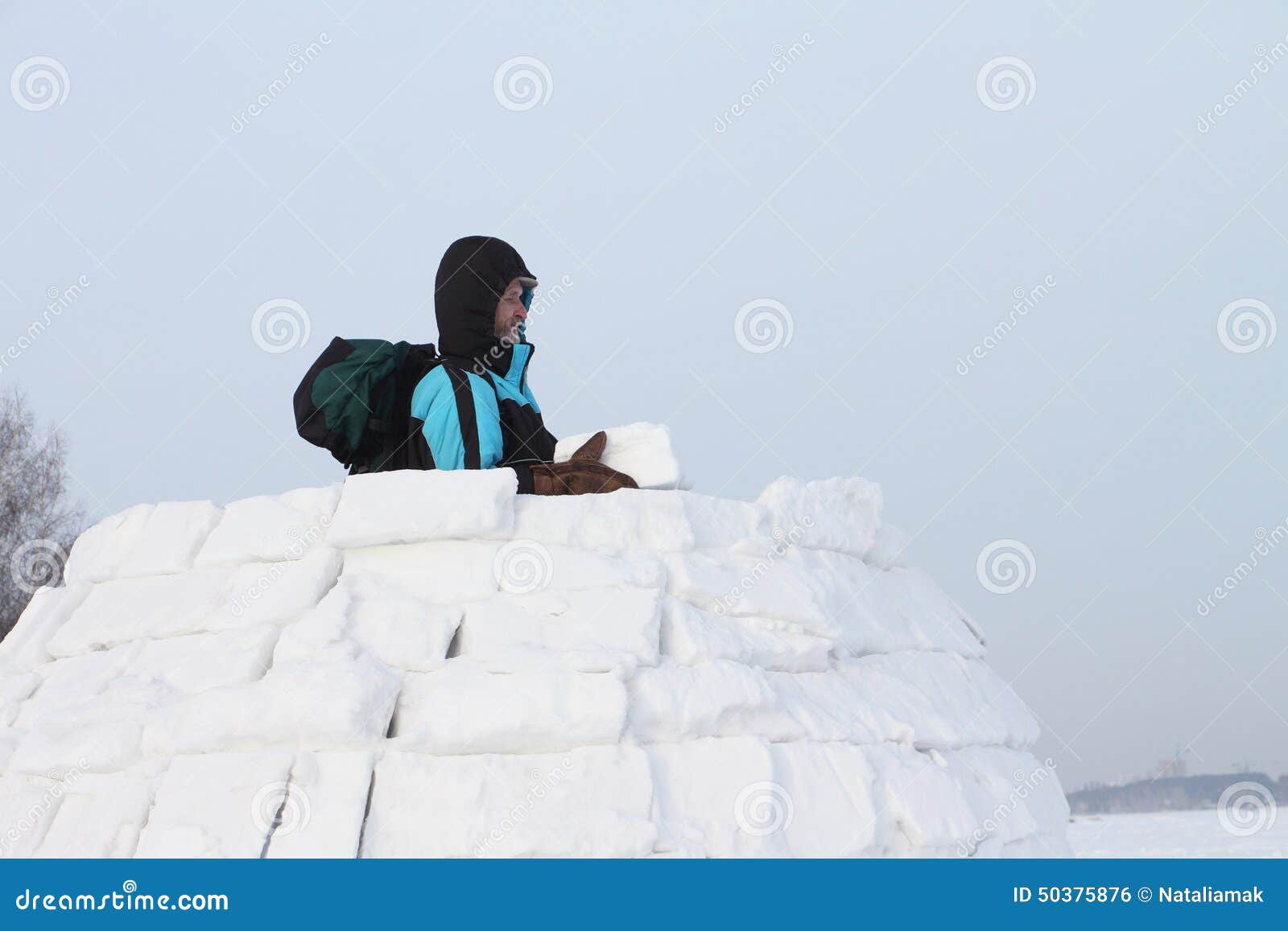 The man building a igloo stock photo. Image of leisure - 50375876