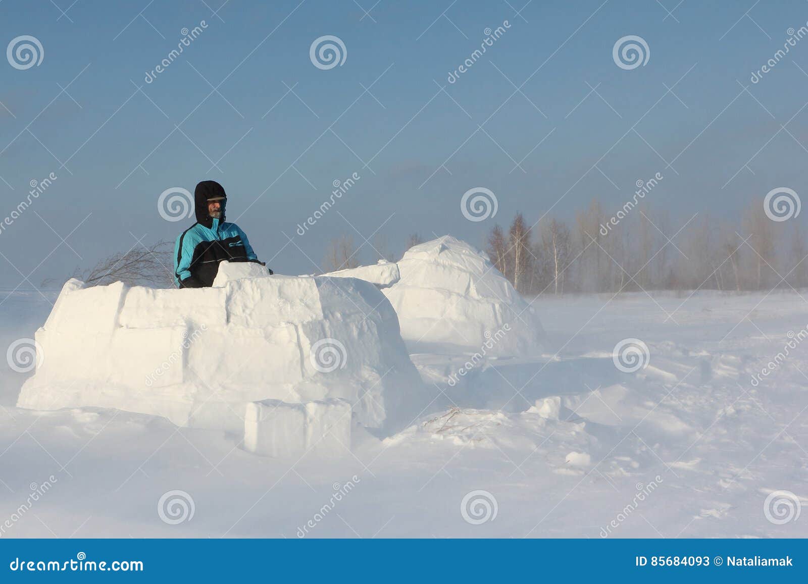 Man Building an Igloo in a Blizzard Stock Image - Image of caucasian ...