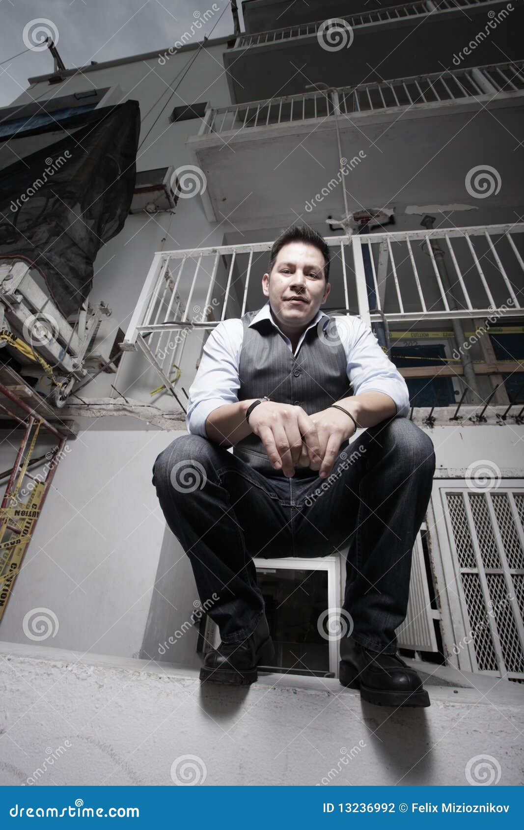 Man on a building ledge stock photo. Image of angel, dark - 13236992