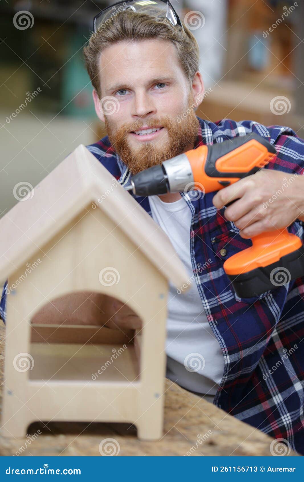 Man building in new house stock image. Image of house - 261156713