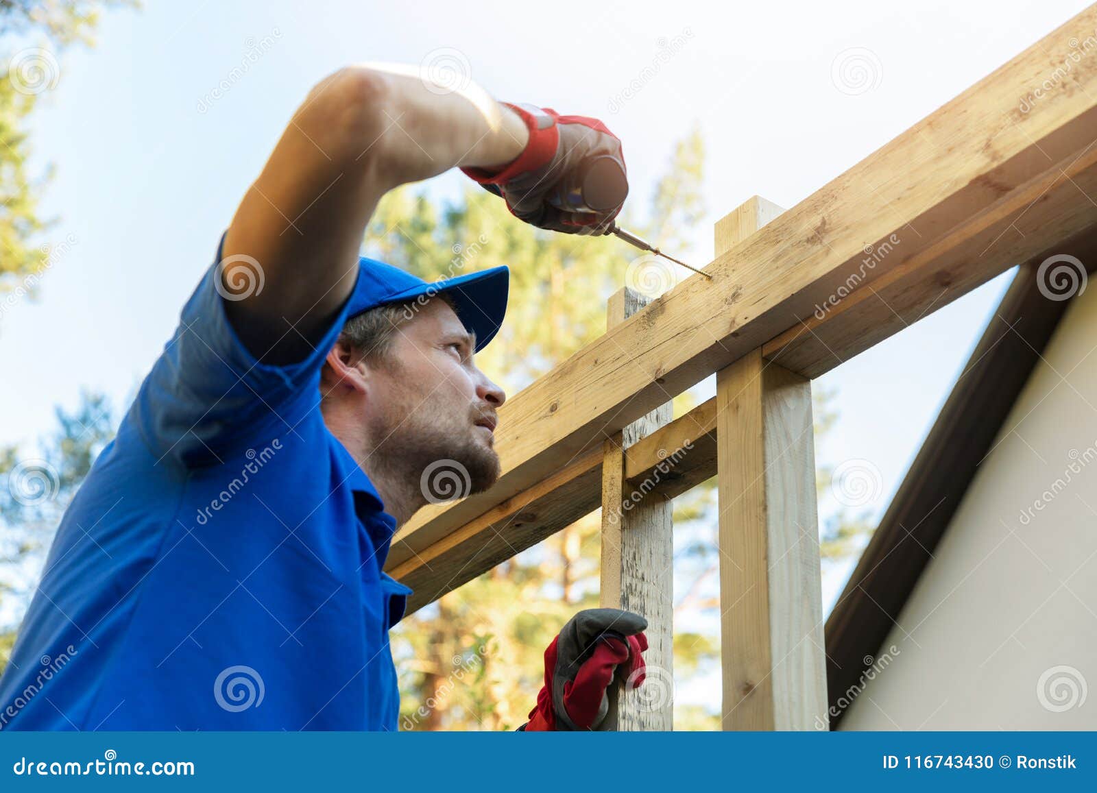 Man is Building a Wooden House Frame Stock Photo - Image of building ...