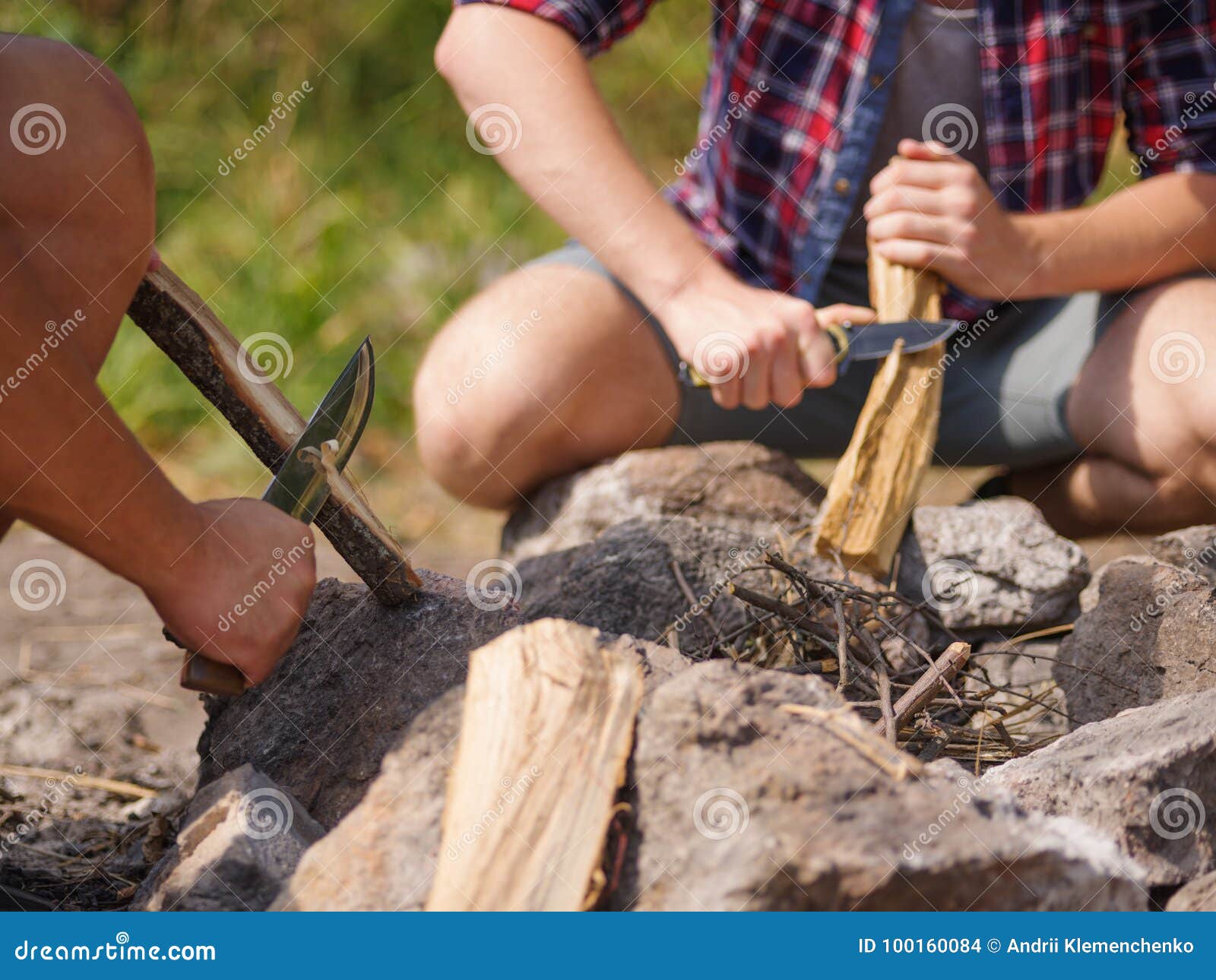Man Builds Fire Pit Around Open Camp Fire Stock Photo - Image of embers ...