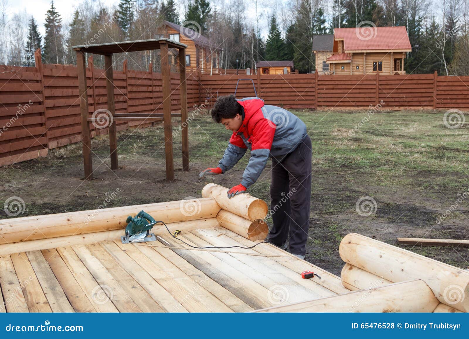 Man Builds A Structure Of Wooden Blocks With The Word Power. Building ...