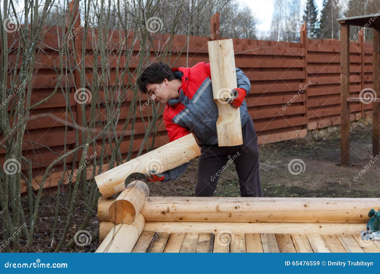 Man Builds Structure Made of Logs Stock Image - Image of fence, board ...