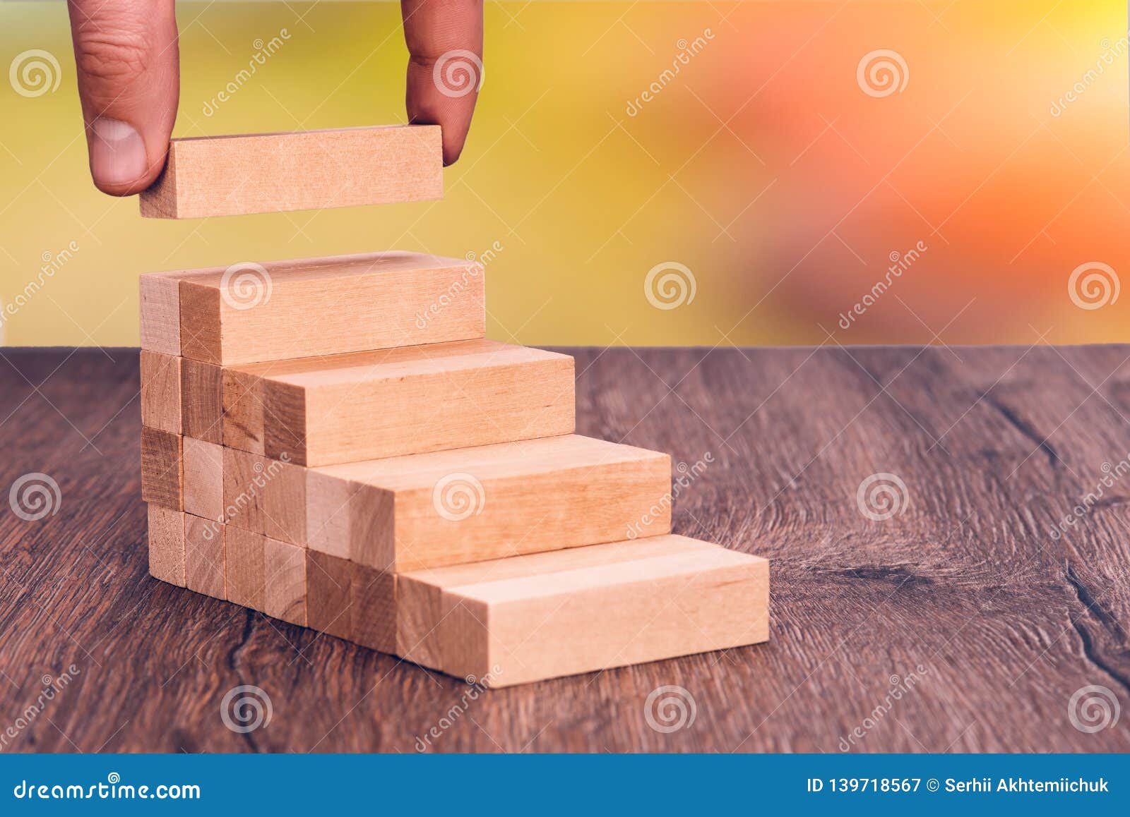 Man Builds a Wooden Ladder. Concept: Stable Development Stock Image ...