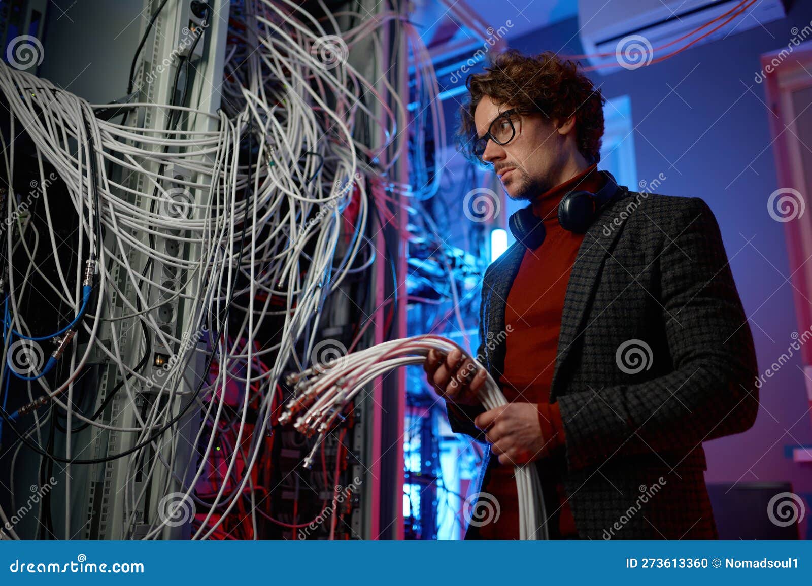 It Man with Bunch of Cables in Hands in Server Room Stock Photo - Image ...