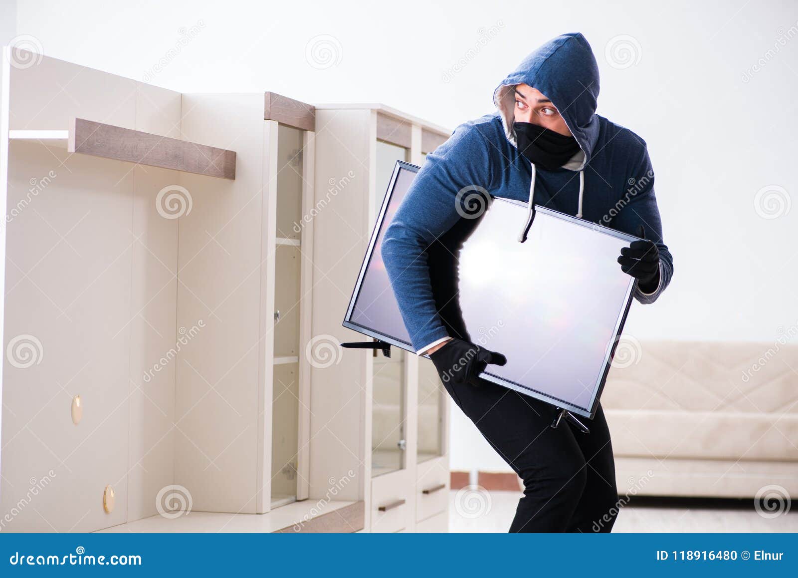 The Man Burglar Stealing Tv Set from House Stock Photo - Image of house ...
