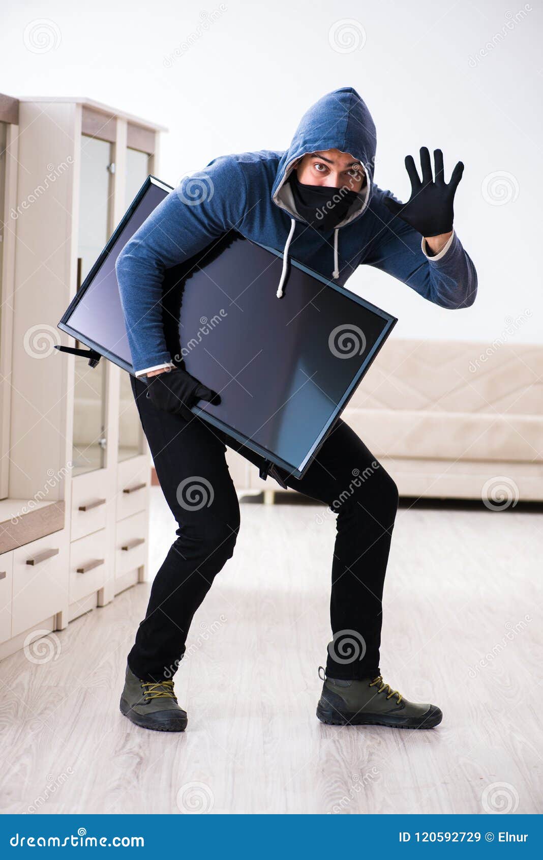 The Man Burglar Stealing Tv Set from House Stock Image - Image of mask ...