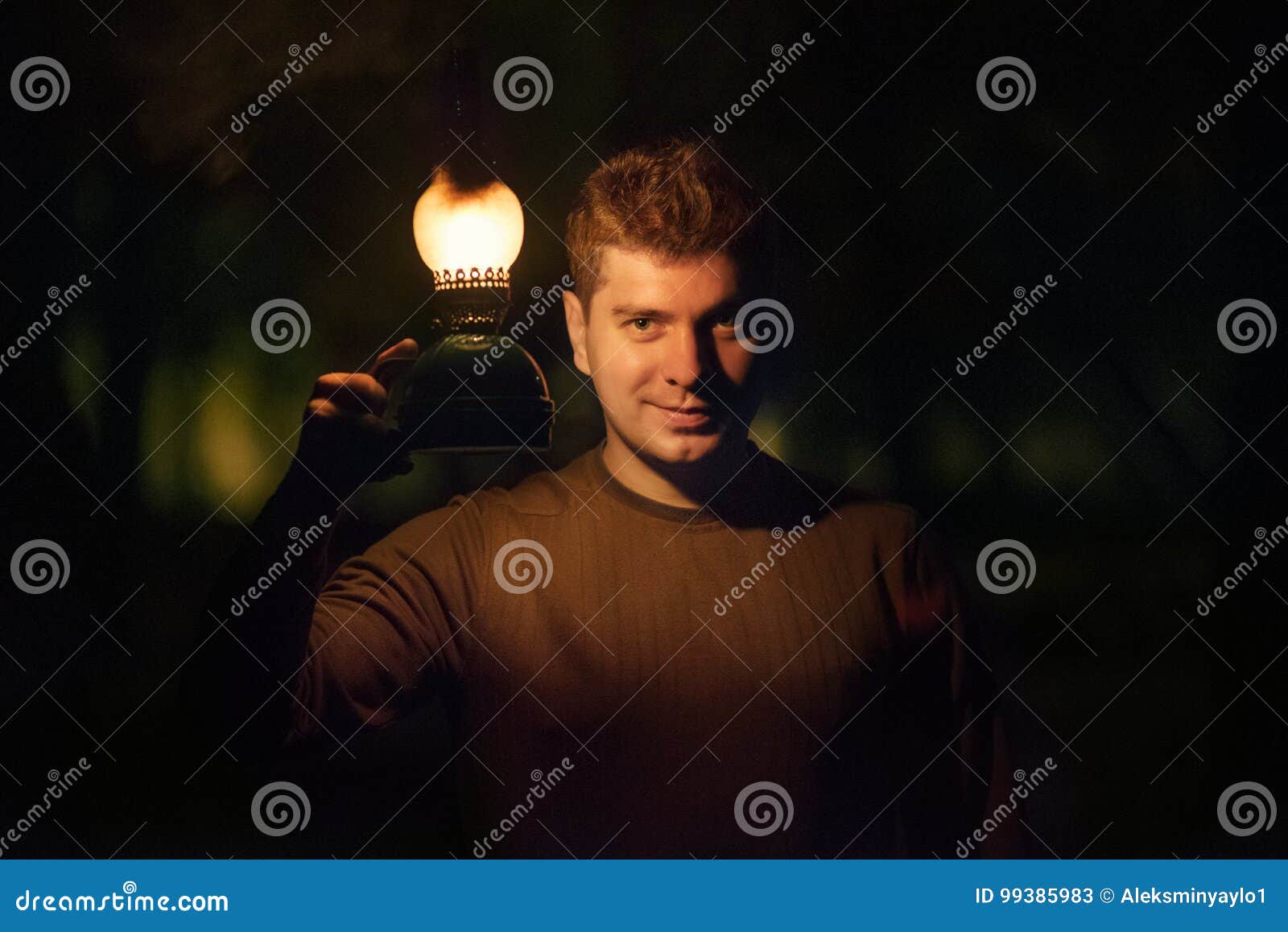 Man with a Burning Lamp in the Dark Forest Stock Image - Image of ...