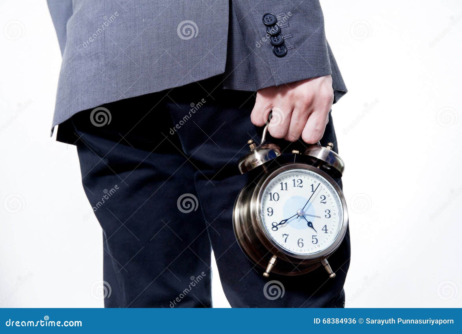 Man in Business Suit Holding a Clock - on Time and Business Concept ...