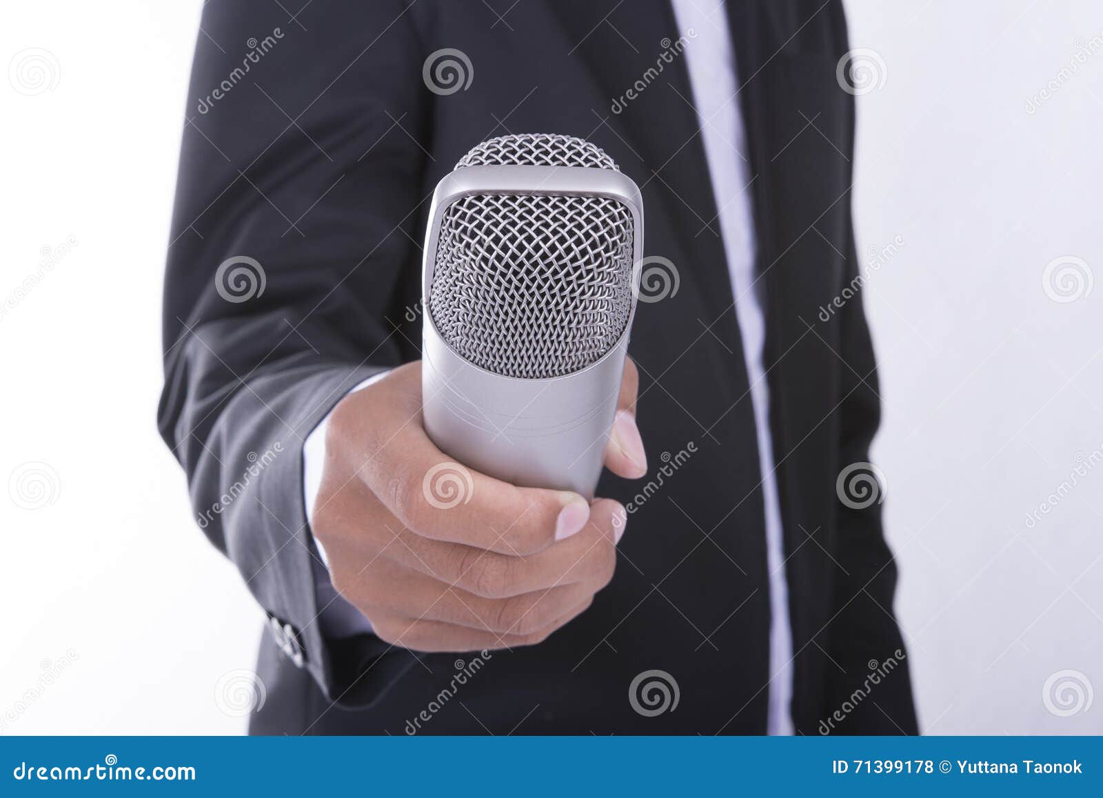 Man in Business Suit Holding Microphone - Interview Concept Stock Photo ...