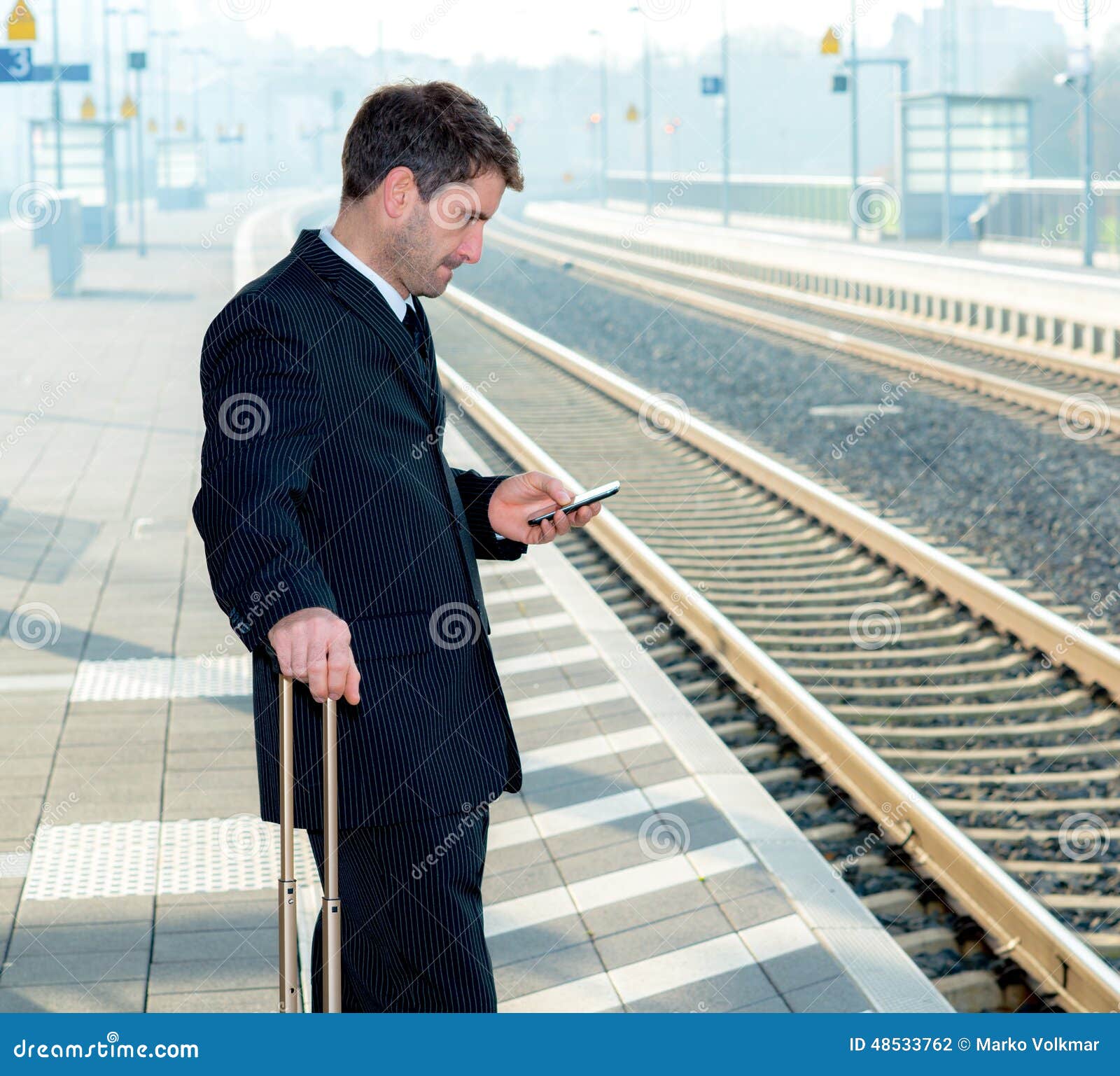 Man on Business Trip Using His Smartphone Stock Photo - Image of ...