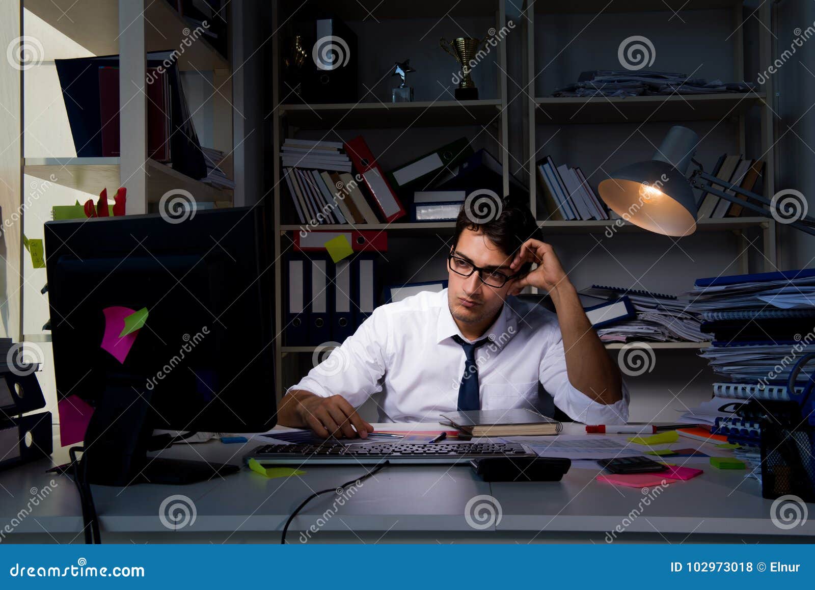 The Man Businessman Working Late Hours in the Office Stock Photo ...