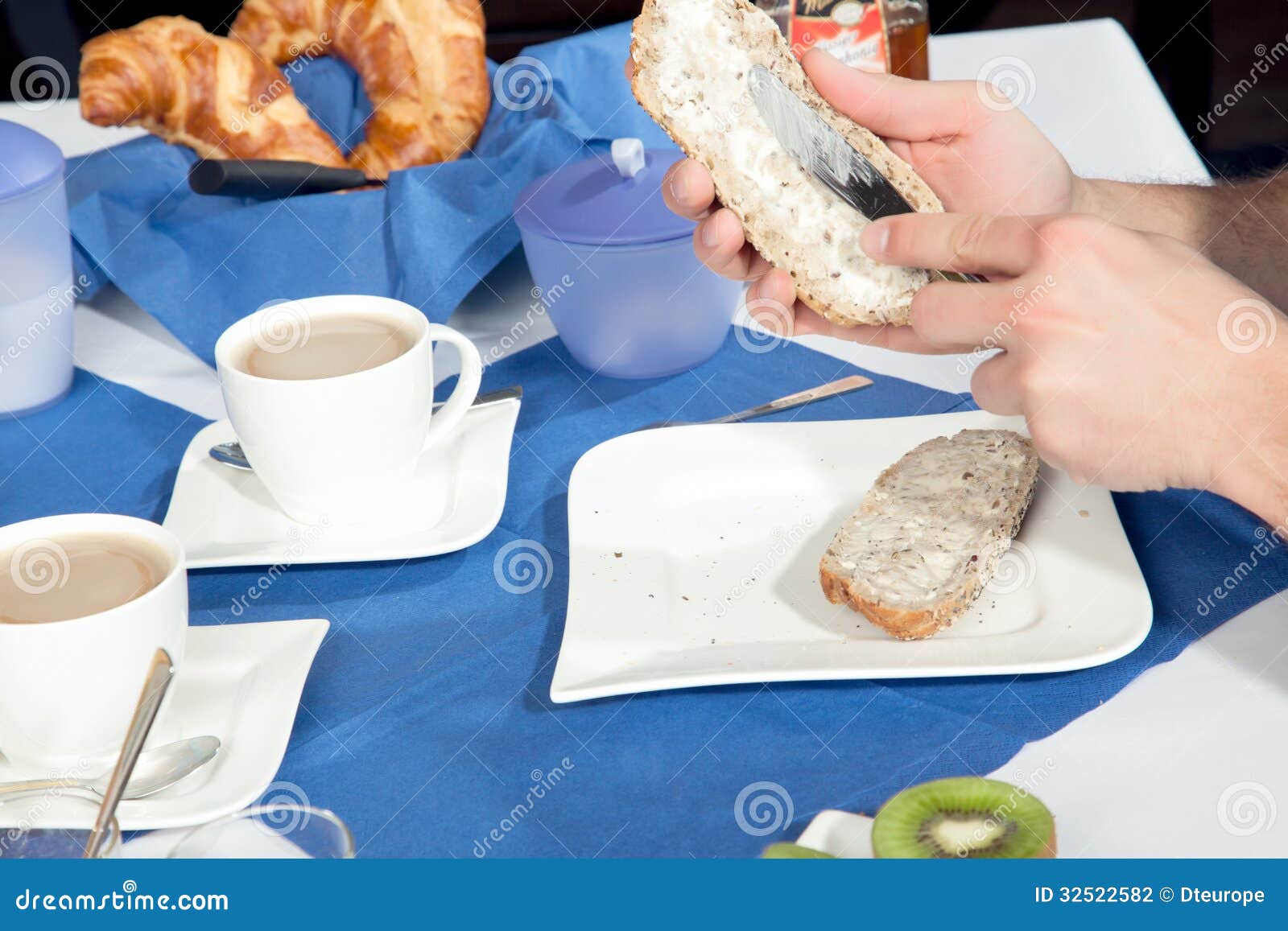 Man Buttering His Roll at Breakfast Stock Photo - Image of buttering ...