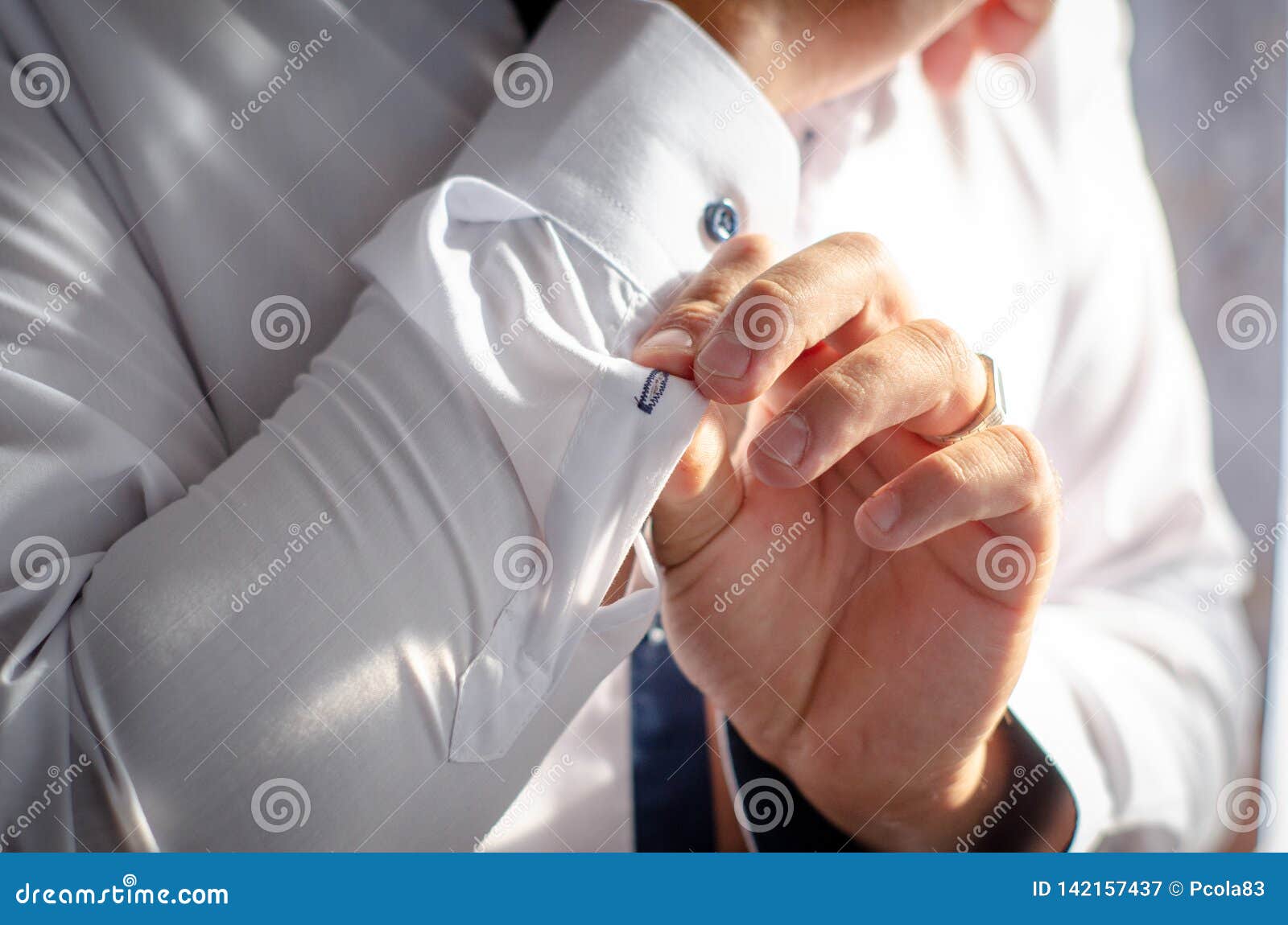Man Buttoning Buttons on Shirts Stock Image - Image of white, buttons ...
