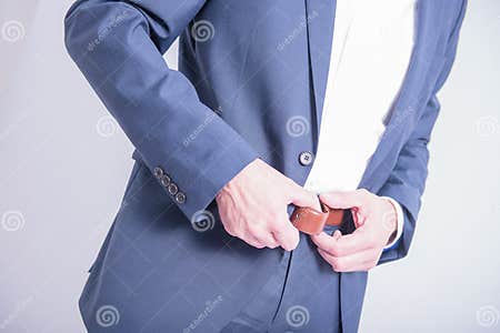 Man buttoning his pants on stock photo. Image of body - 65618578