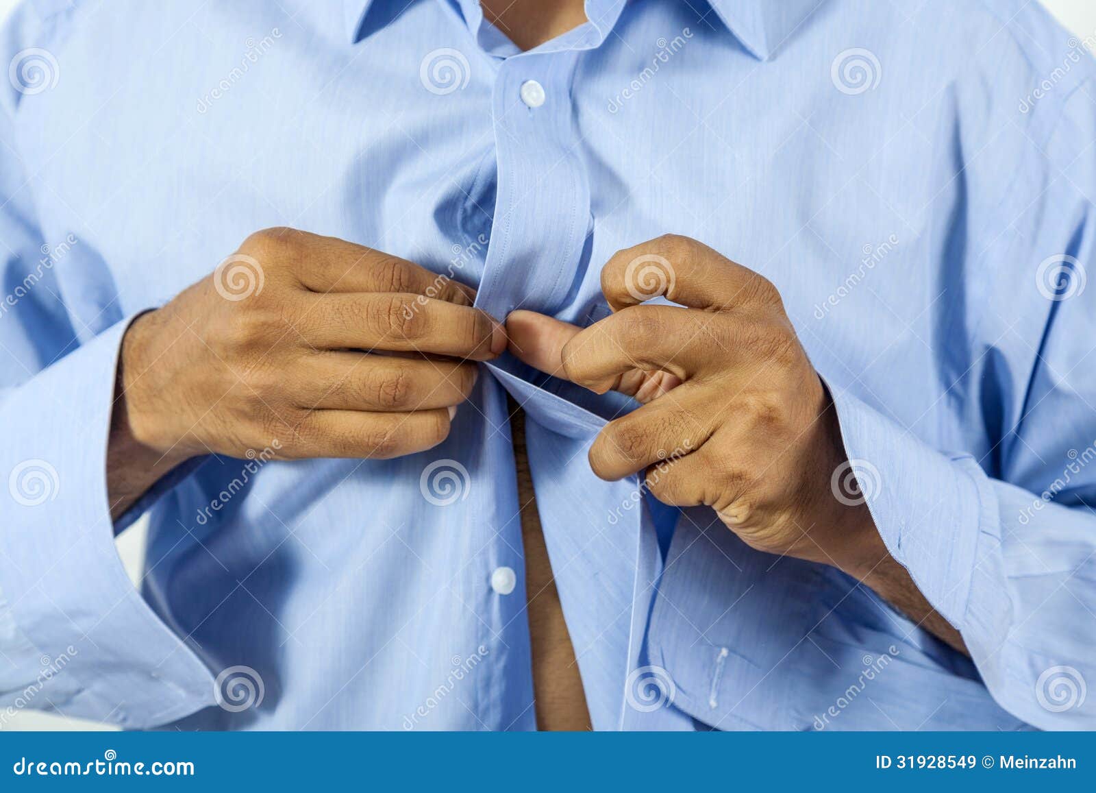 Man buttoning his shirt stock image. Image of close, authentic - 31928549