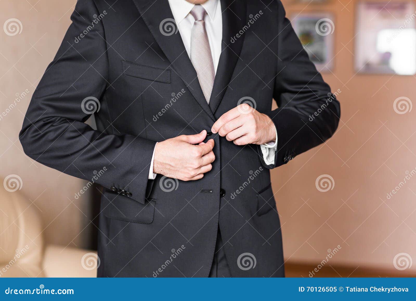 Man buttoning jacket stock image. Image of confident - 70126505