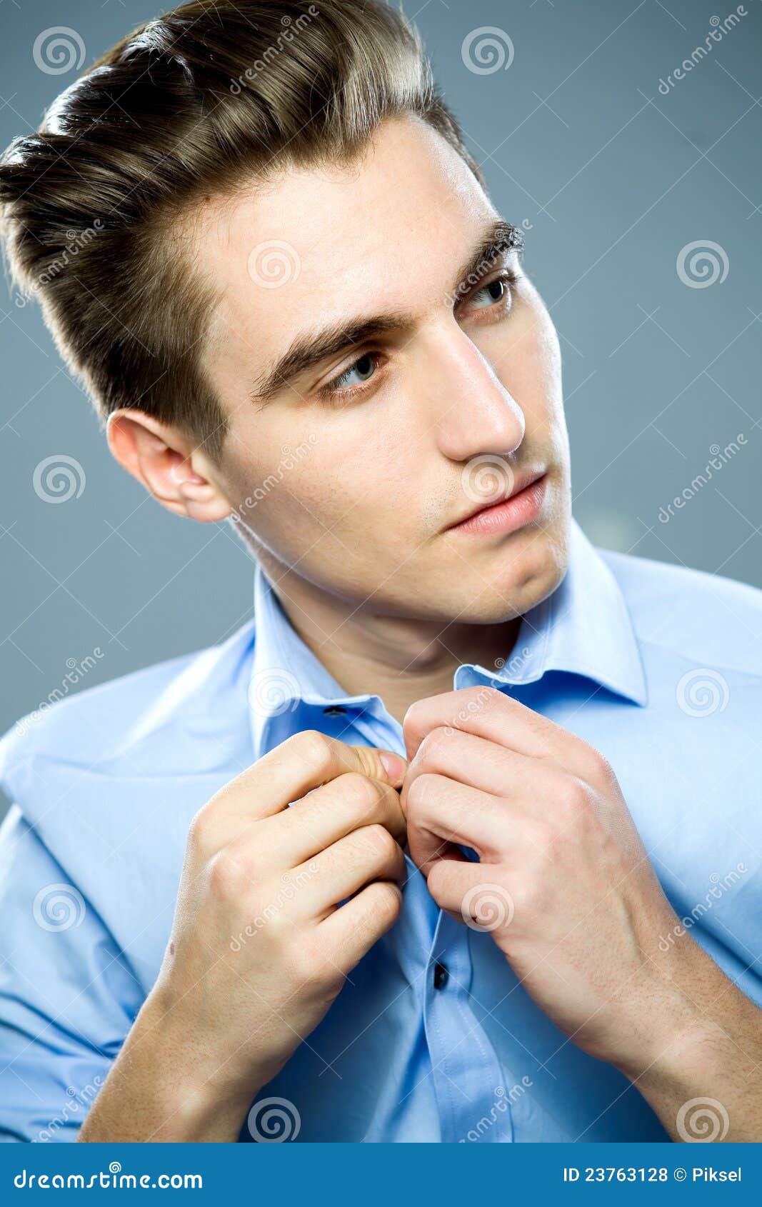 Man buttoning shirt stock photo. Image of shot, beauty - 23763128
