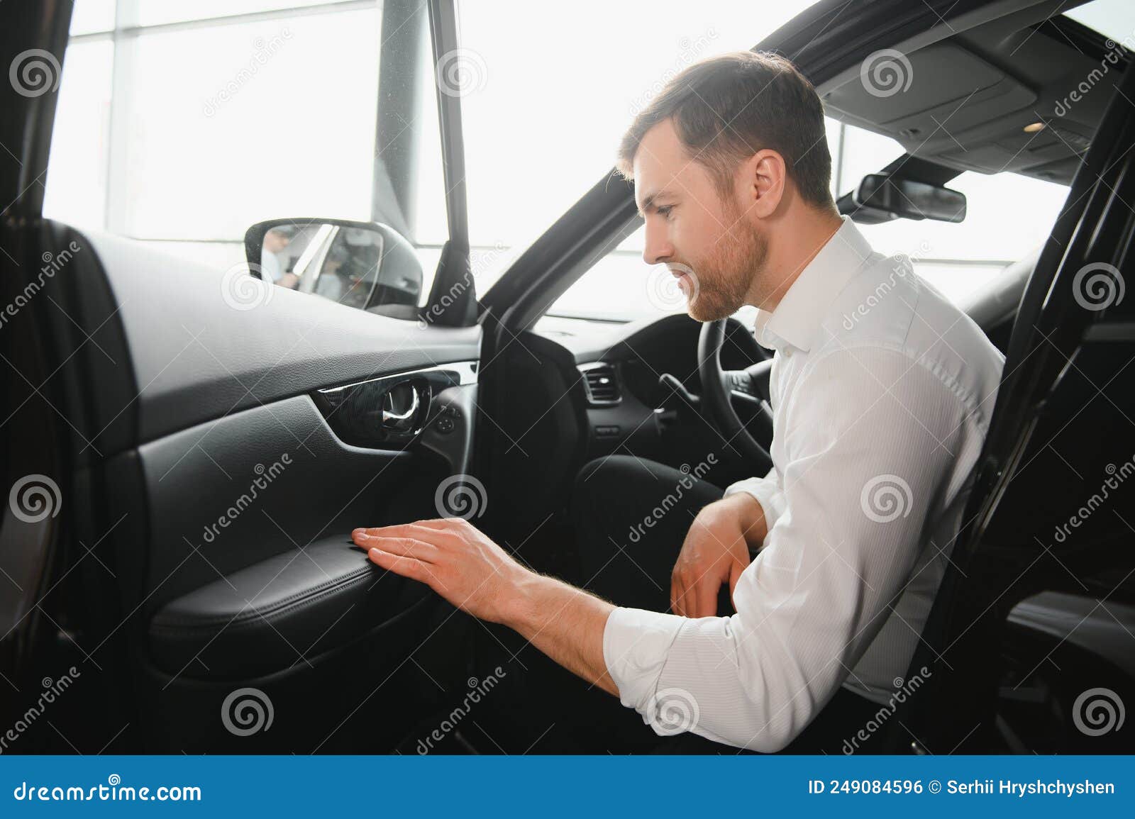 Man Buying a Car at a Showroom Stock Photo - Image of handsome, buyer ...