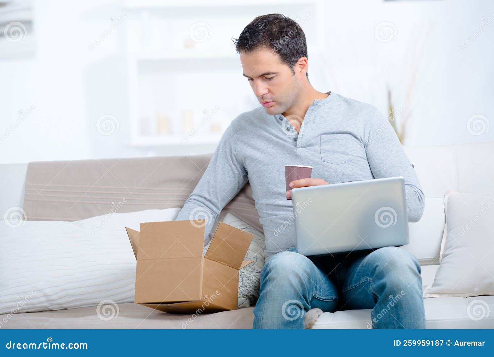 Man buying online stock image. Image of enjoyment, cheerful - 259959187