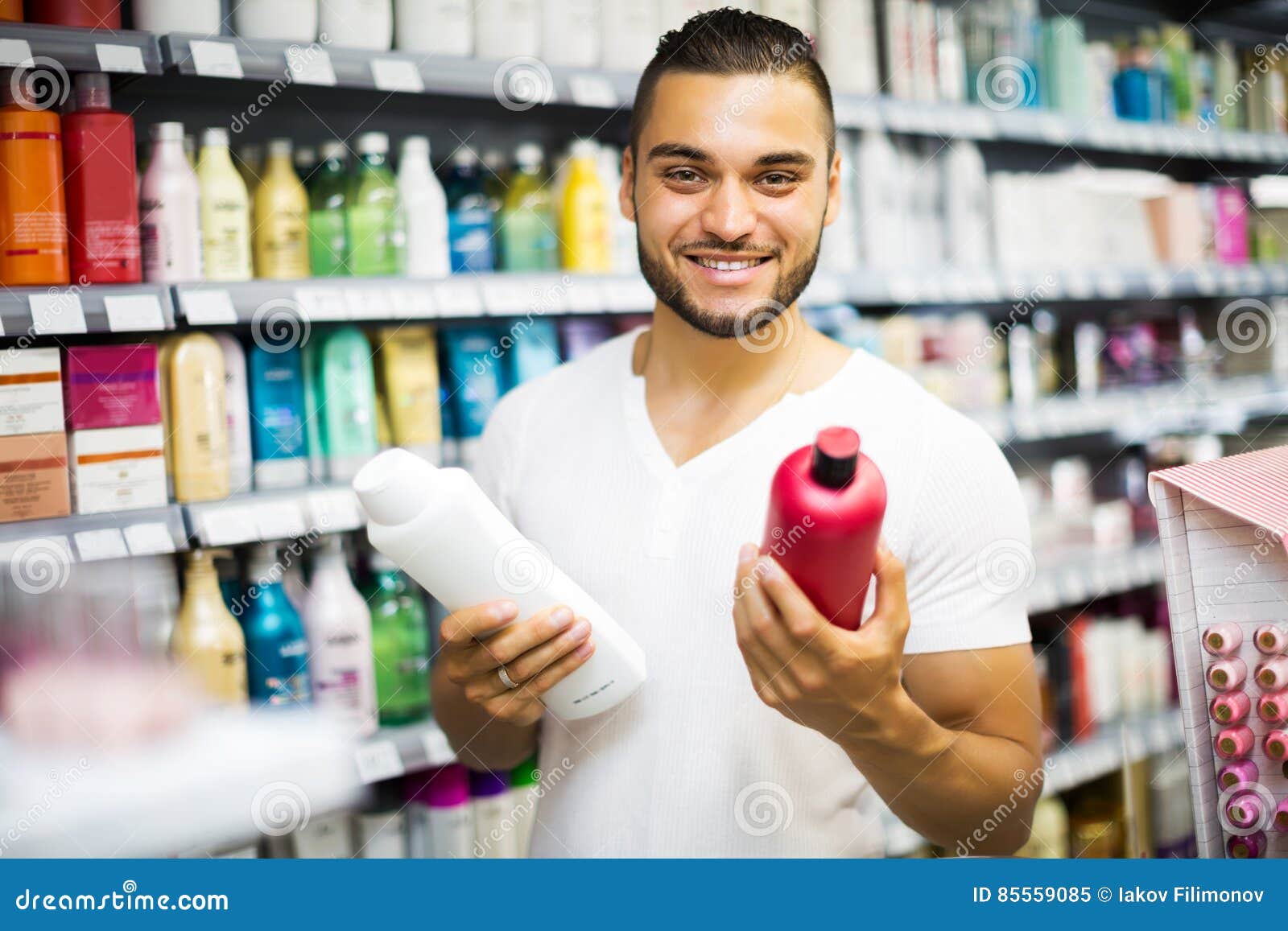 Man buying shampoo stock image. Image of standing, happiness - 85559085