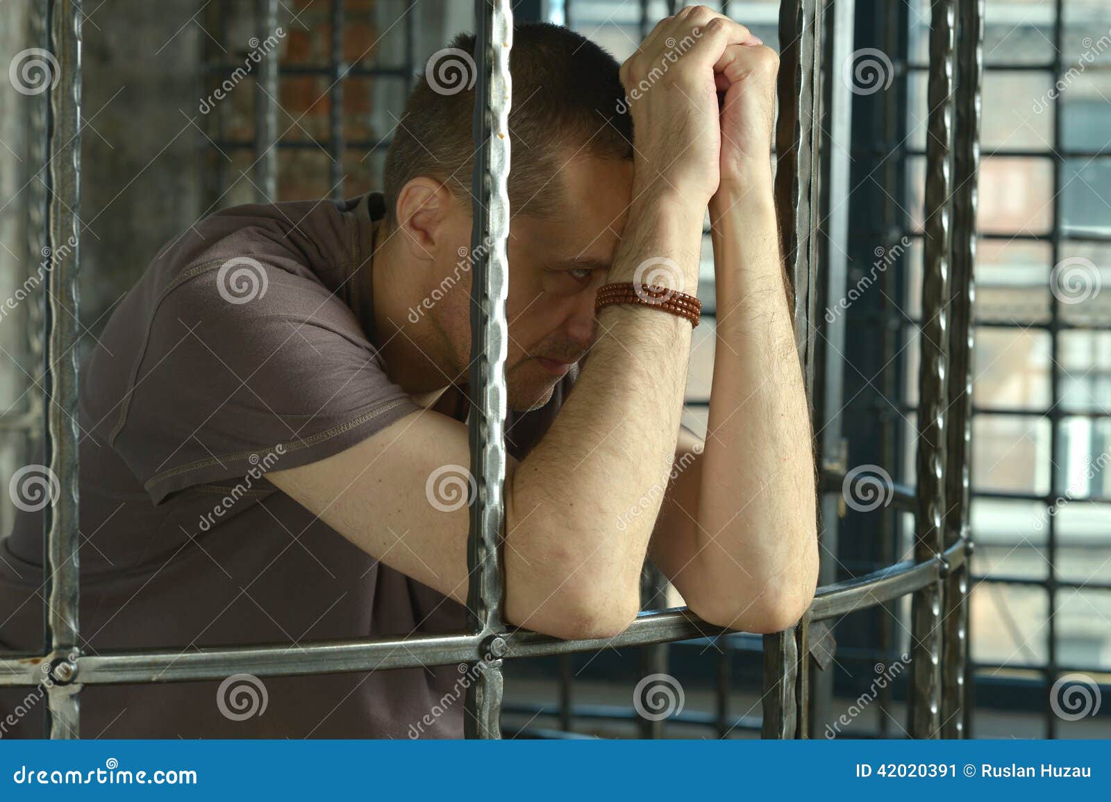 Man in cage with hands stock image. Image of black, halloween - 42020391
