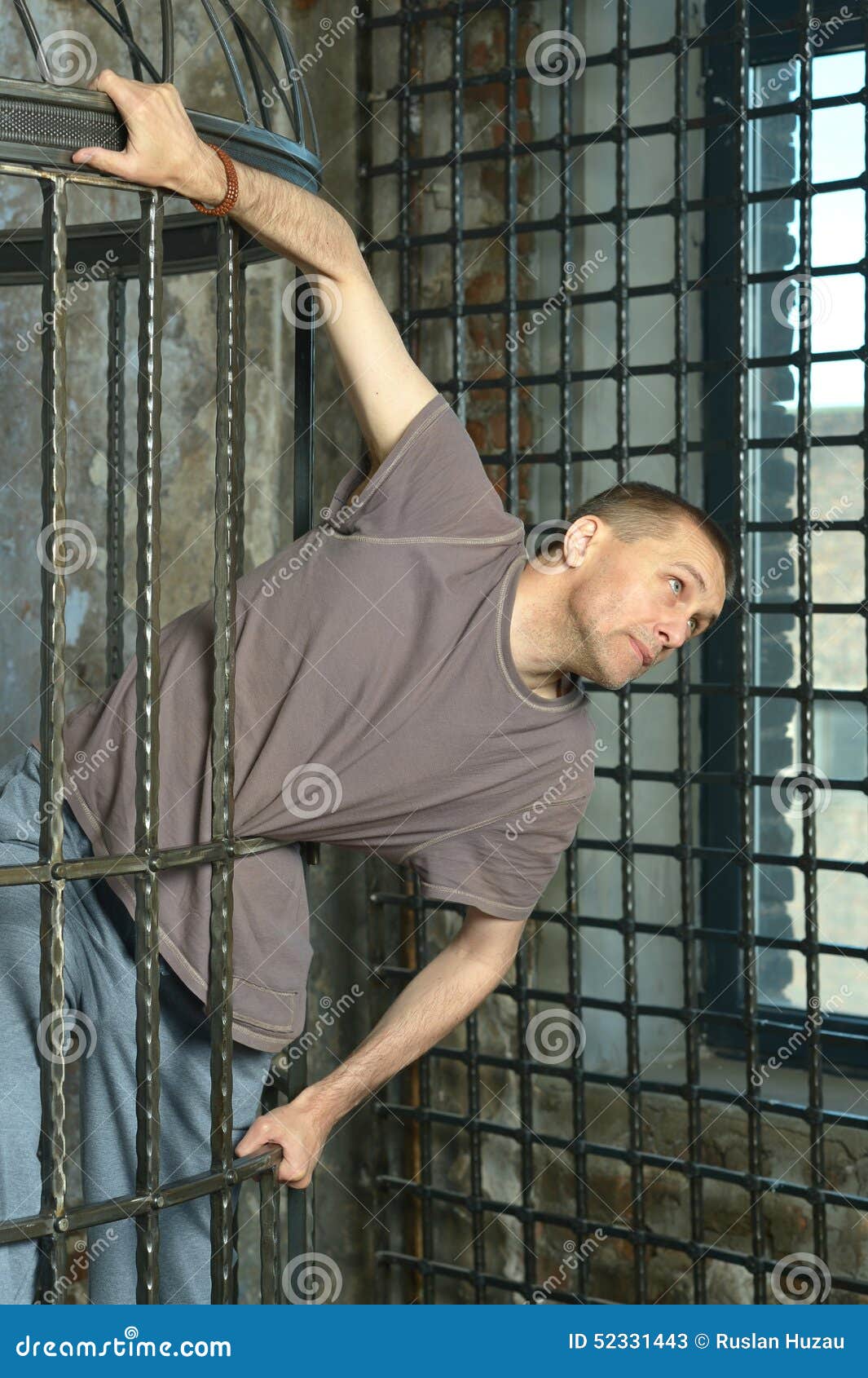Man in cage stock image. Image of grime, detail, convict - 52331443
