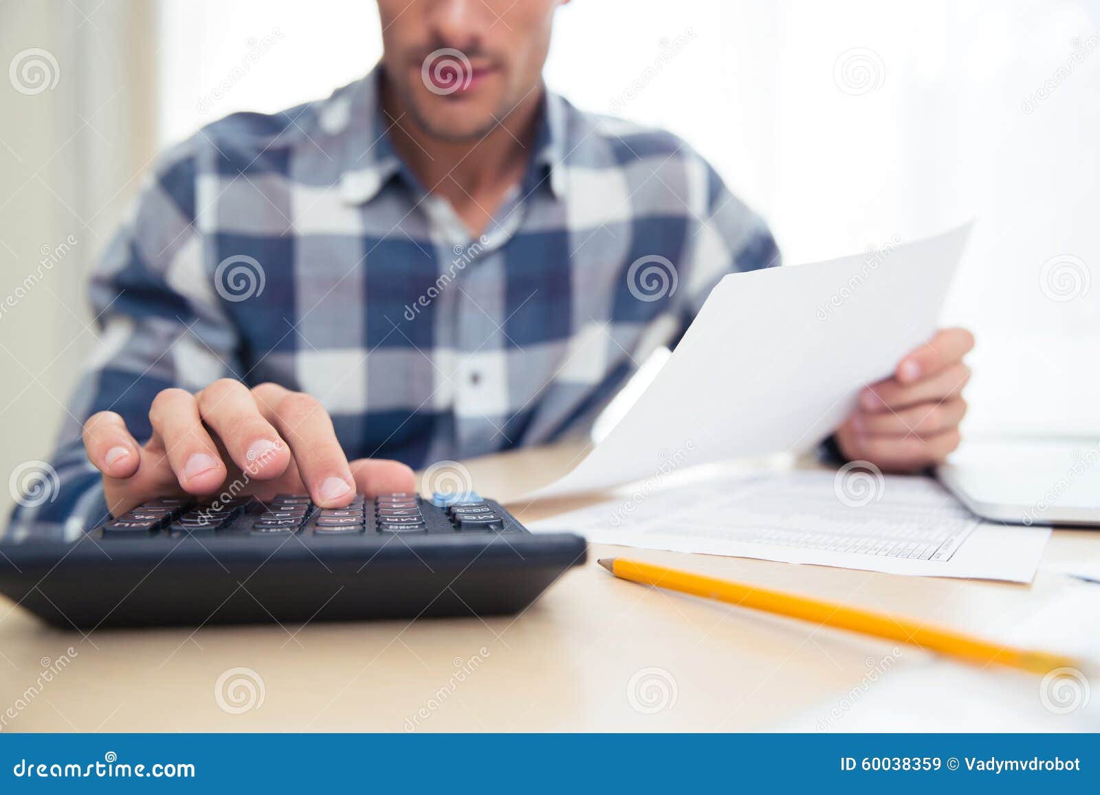 Man with Calculator Checking Bills Stock Image - Image of finance ...