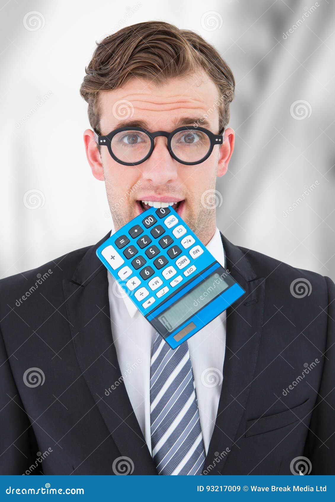 Man with Calculator in Mouth Against Blurry Grey Background Stock Image ...