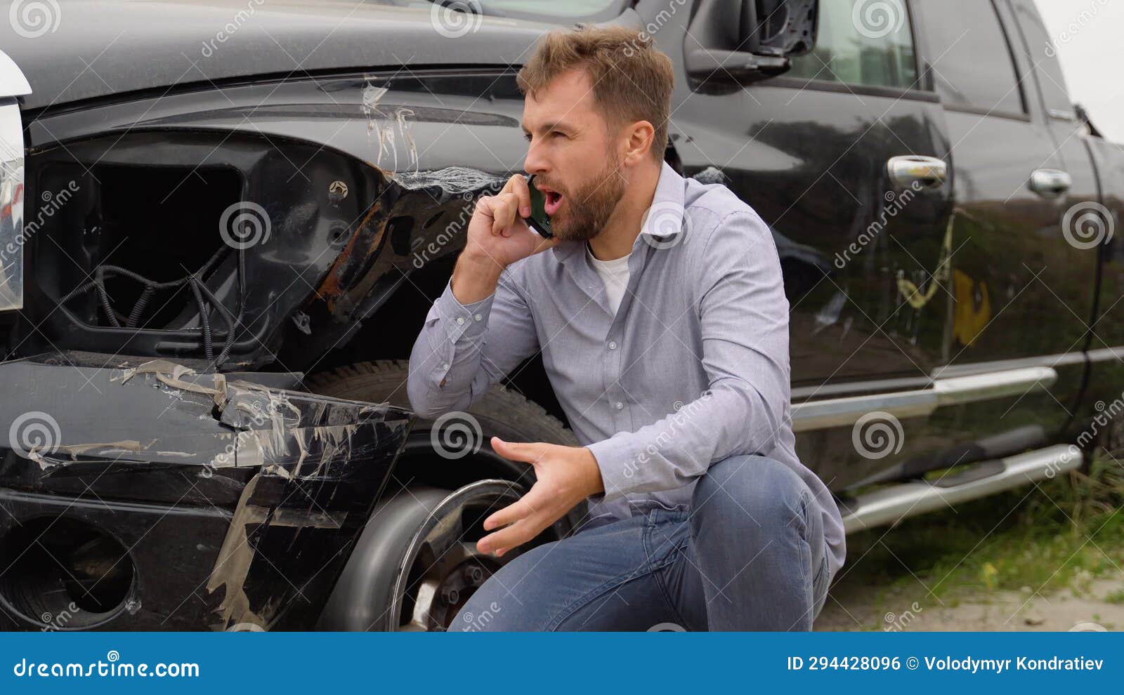 A Man Calling Car Mechanic Insurance Assistance after Car Accident ...
