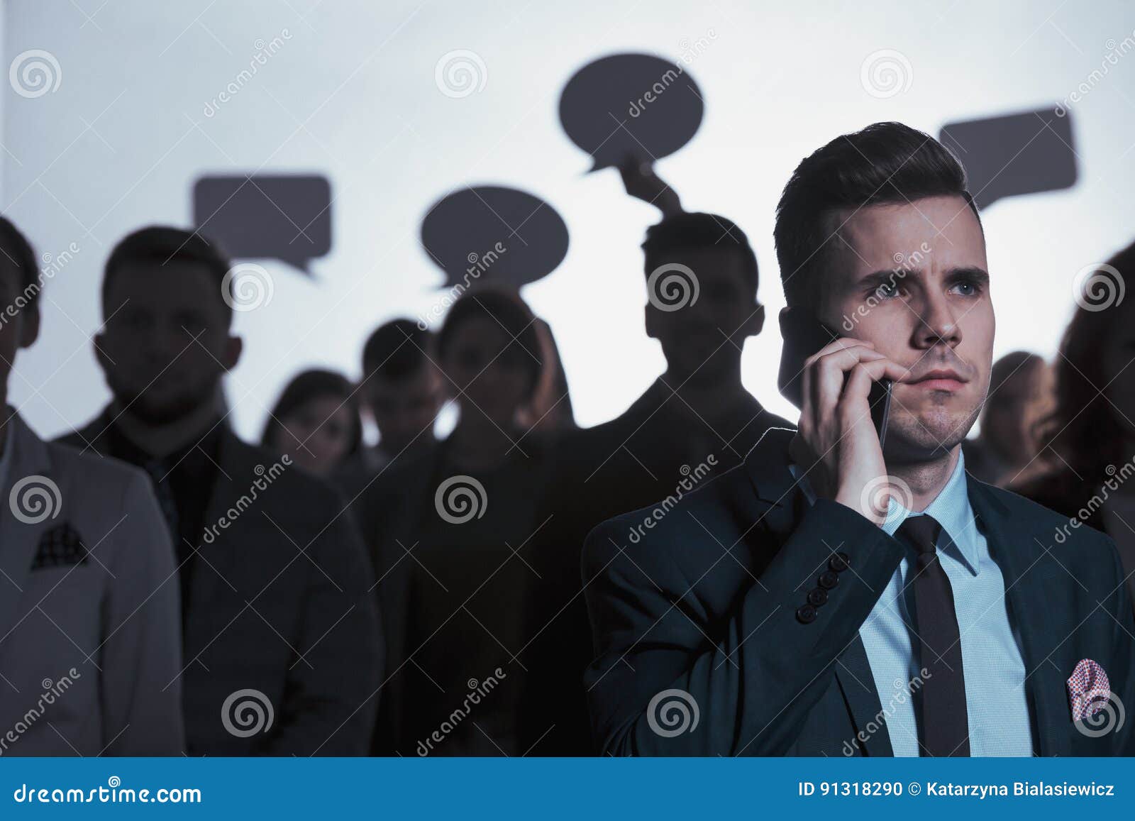 Man calling in a crowd stock photo. Image of blurred - 91318290