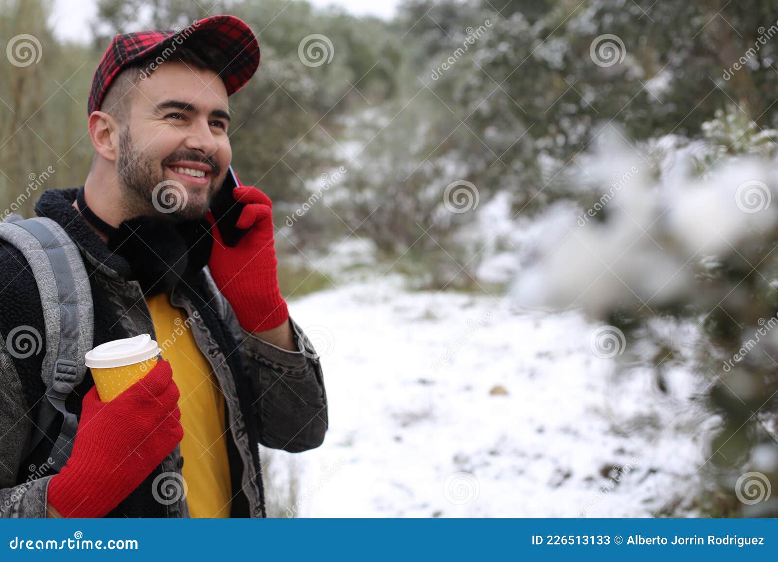 Man Calling while Drinking Hot Coffee in the Cold Winter Stock Image ...