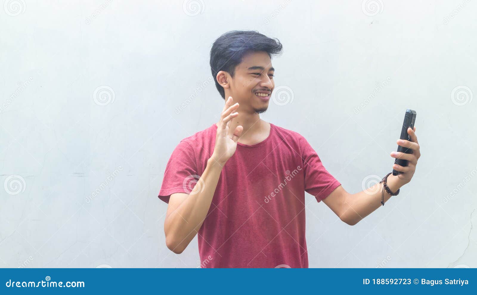 A MAN is CALLING a FRIEND stock image. Image of adult - 188592723