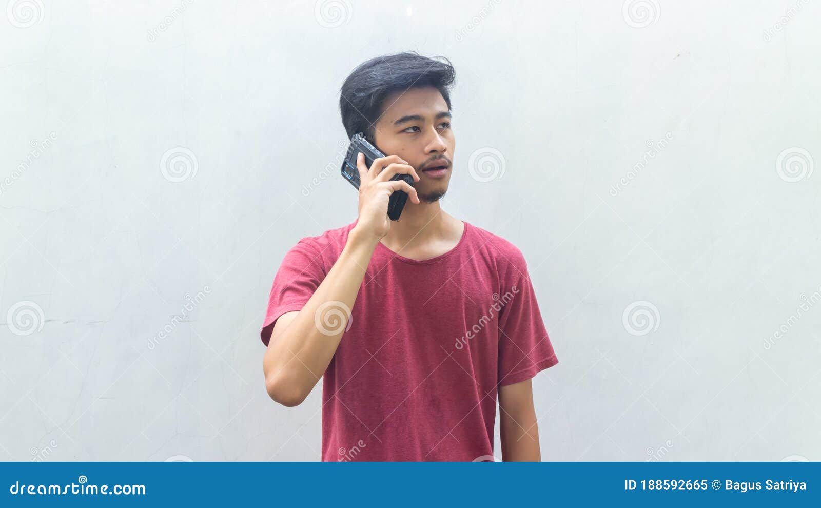 A MAN is CALLING a FRIEND stock image. Image of online - 188592665