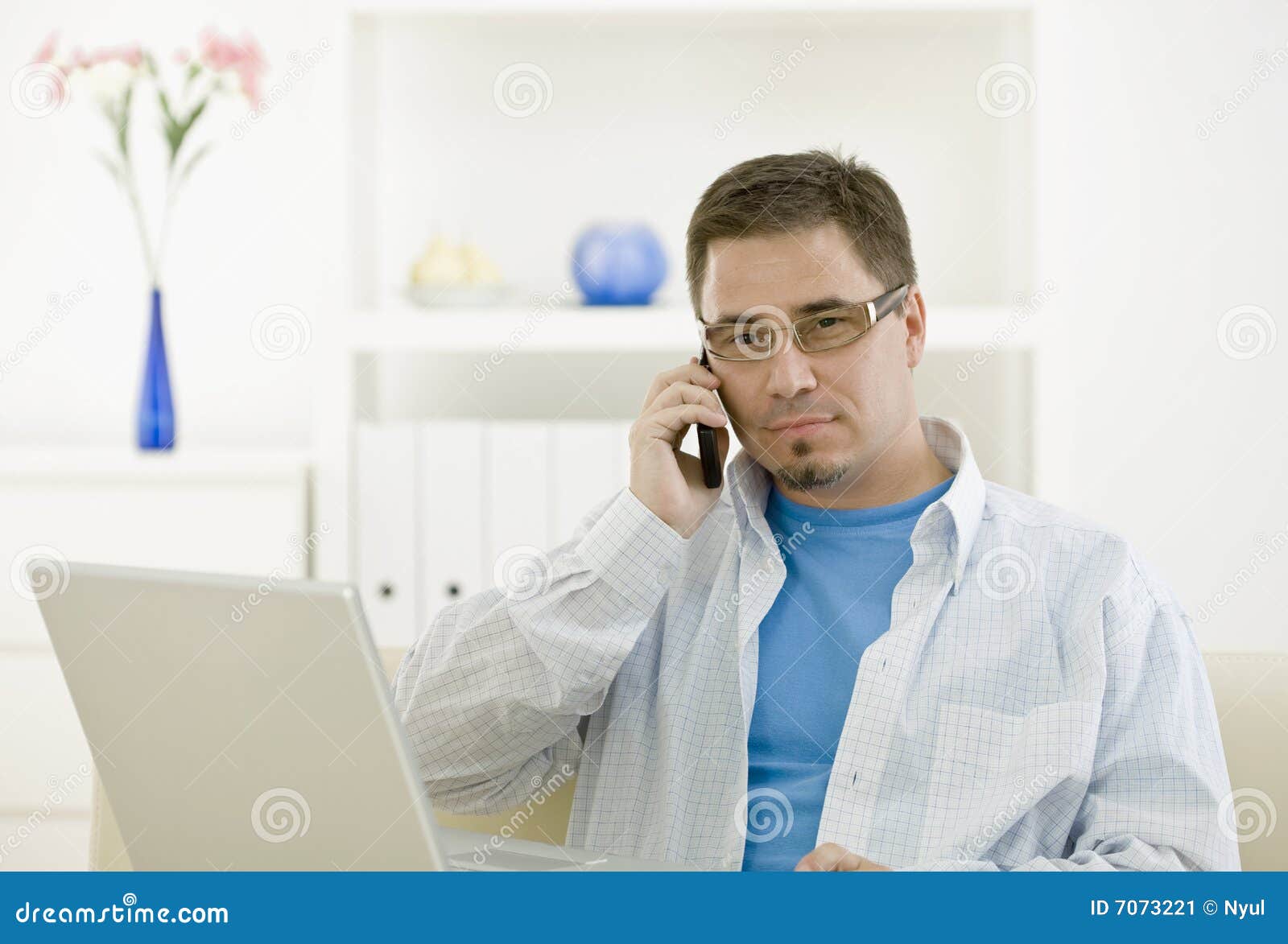 Man Calling on Mobile Phone Stock Image - Image of home, comfort: 7073221