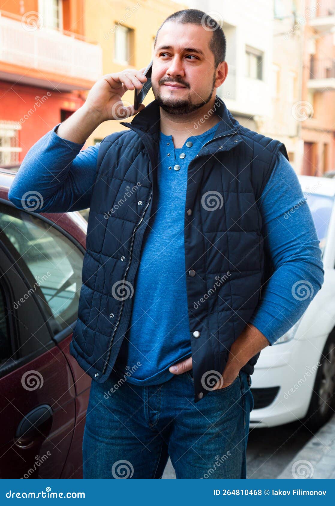 Man calling on phone stock photo. Image of smiling, holding - 264810468