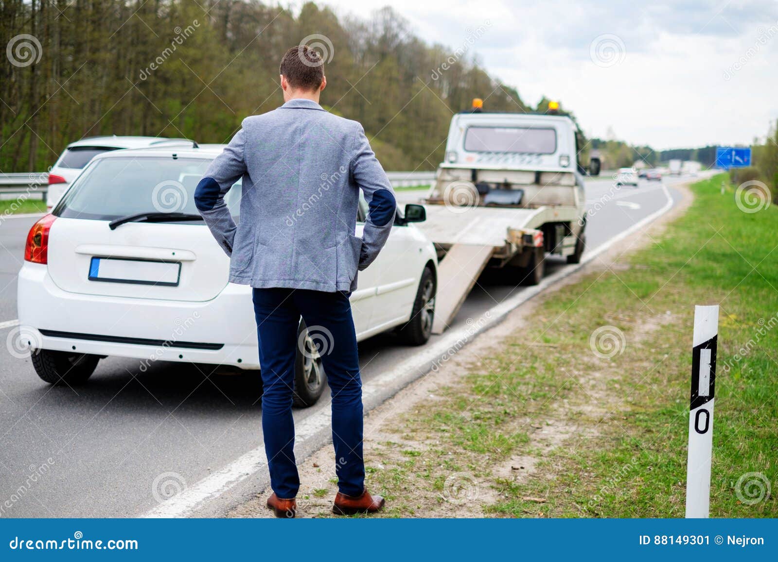 Man Calling while Tow Truck Picking Up His Broken Car Stock Image ...