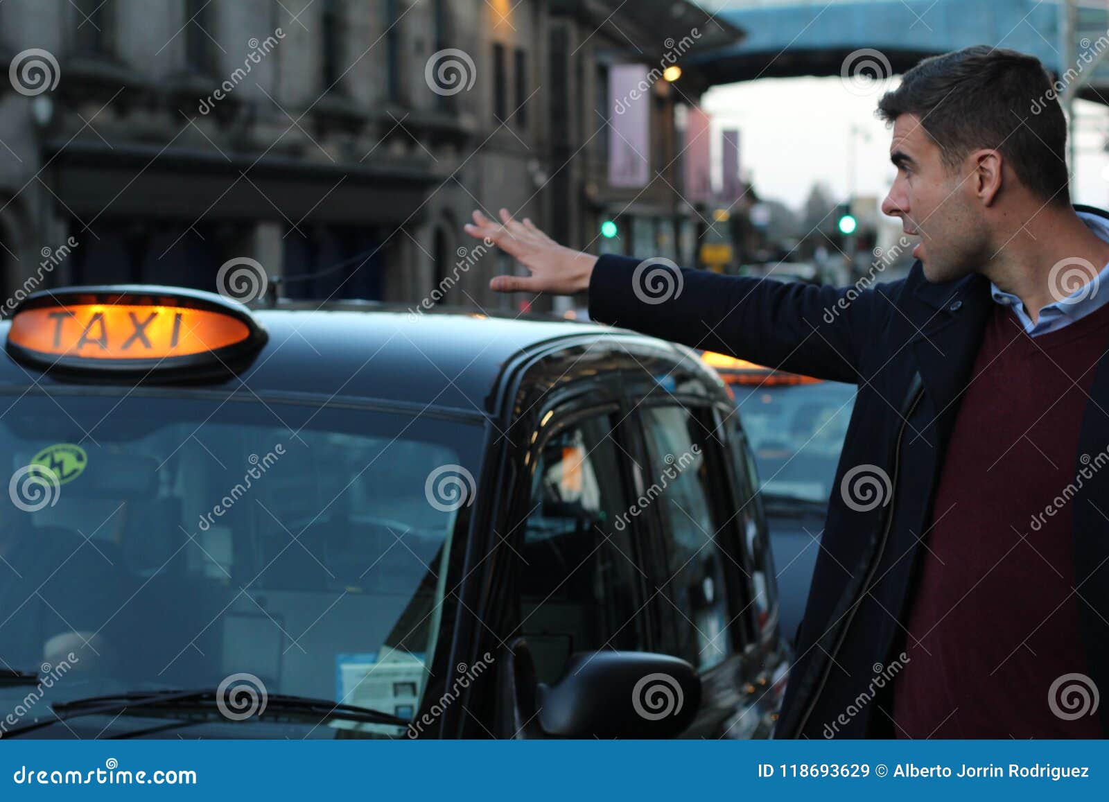 Man Calling a Traditional British Cab Stock Image - Image of metropolis ...