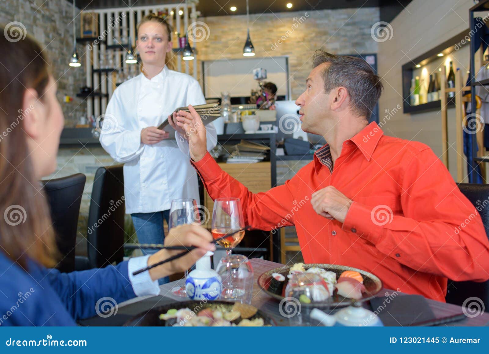 Man Calling Waitress in Restaurant Stock Image - Image of attract ...